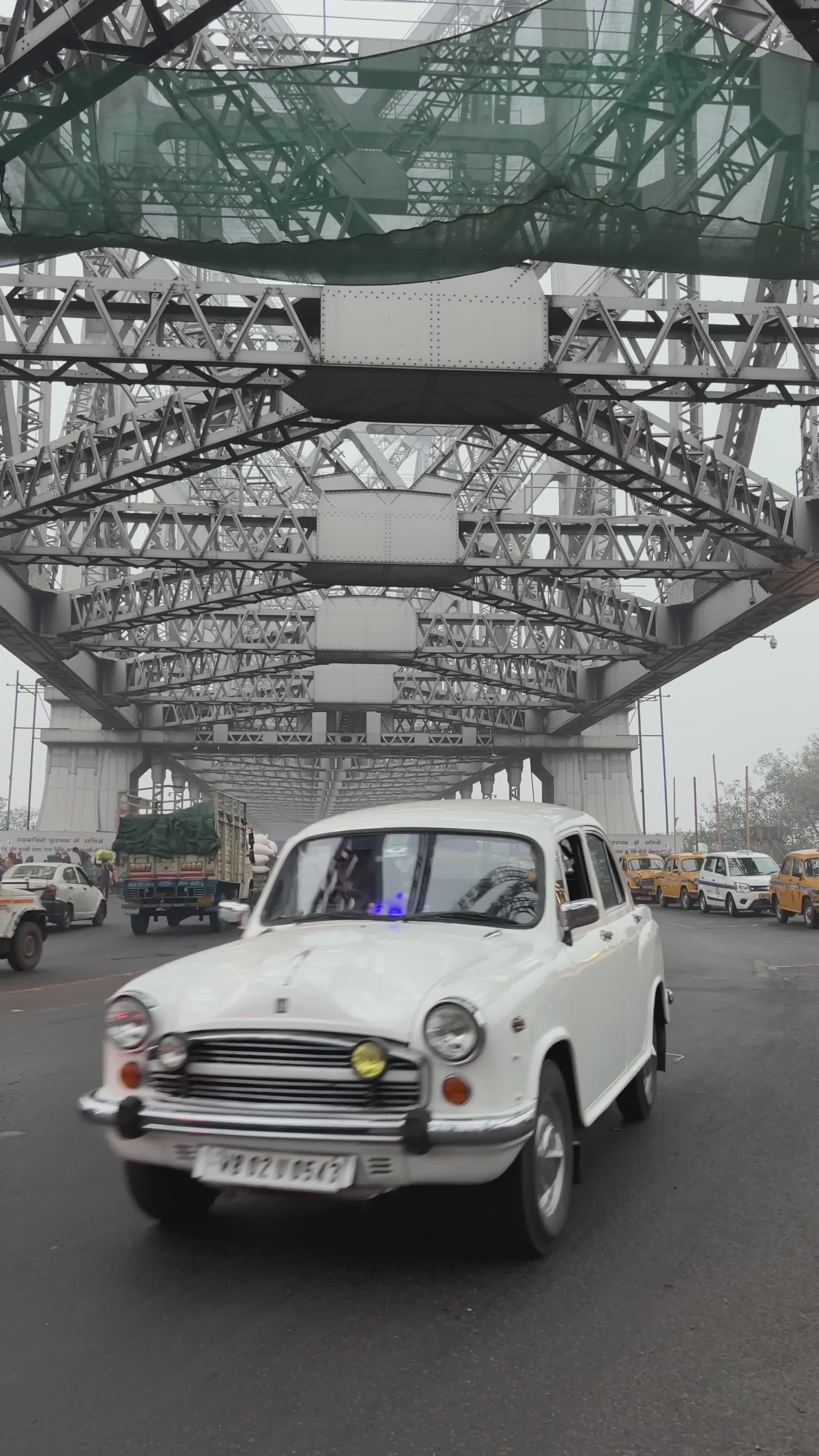 Iconic Howrah Bridge with Vintage Cars in Kolkata Free Stock Video ...