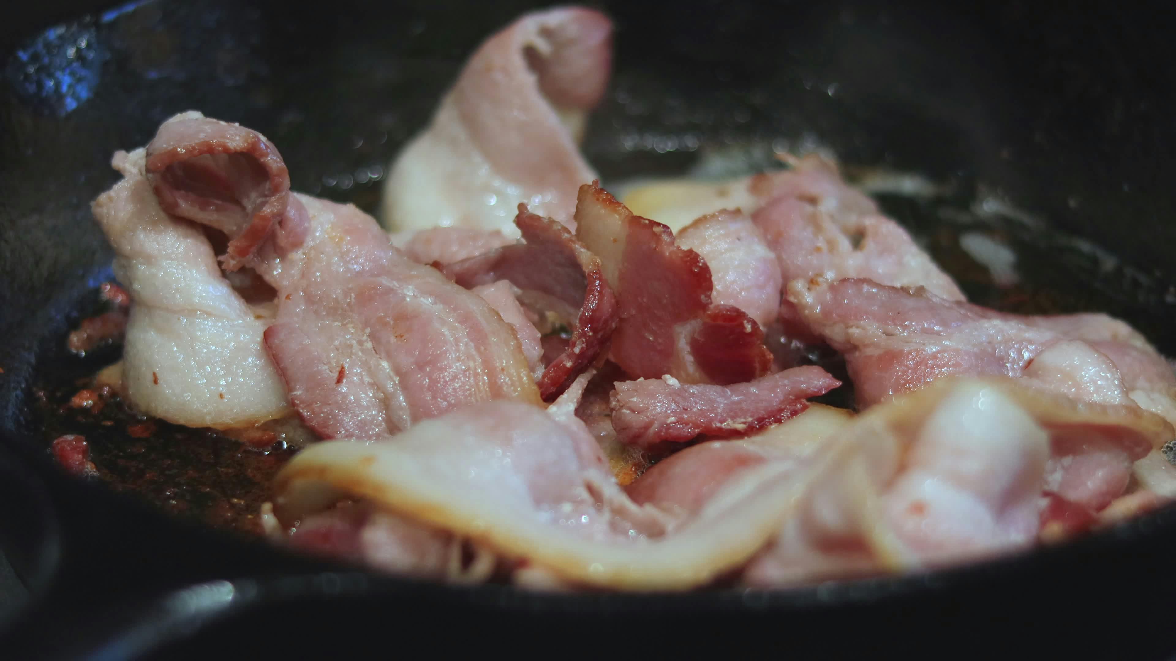 Sizzling Bacon Cooking in Cast Iron Skillet Free Stock Video Footage ...