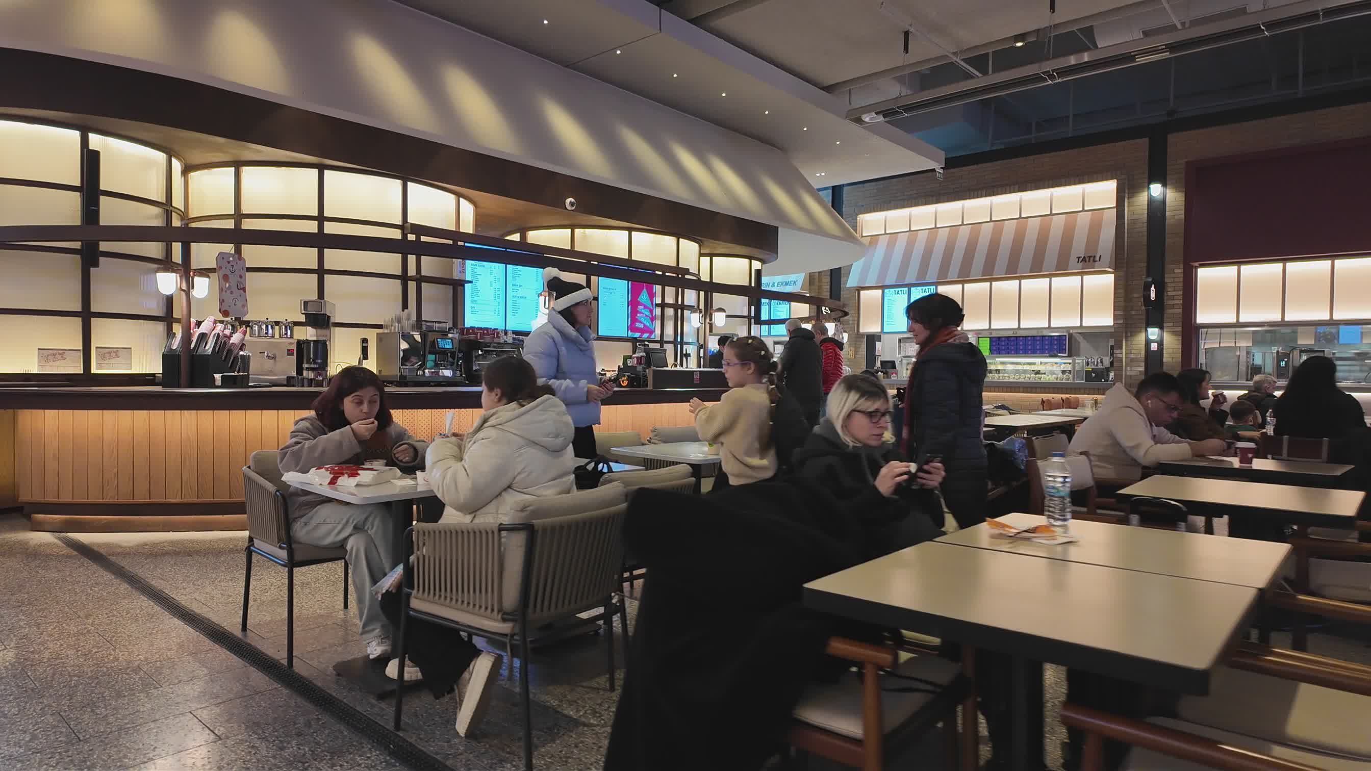 Cozy Cafeteria Scene with Diverse Visitors Free Stock Video Footage ...