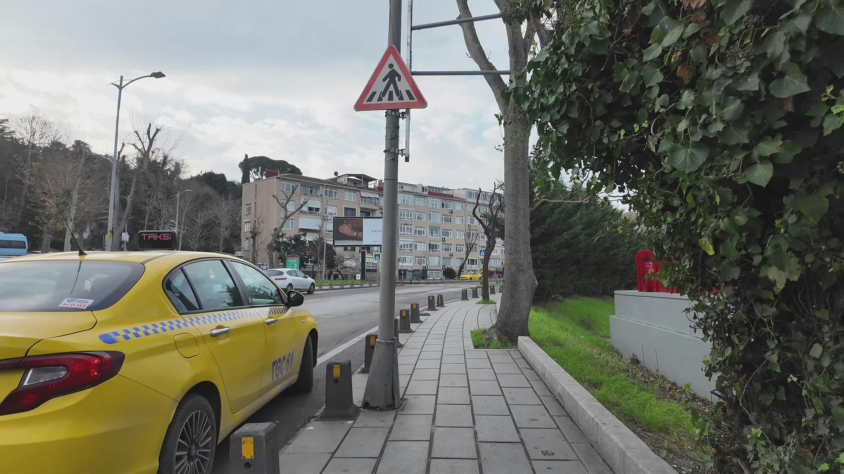Urban Street Scene with Yellow Taxi and Traffic Free Stock Video ...