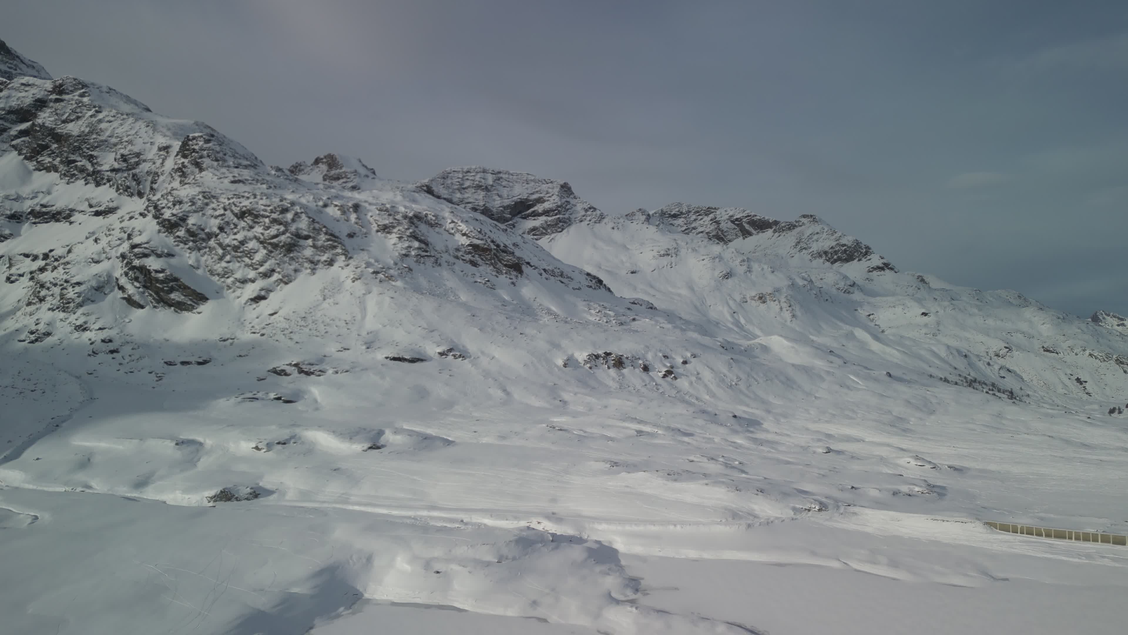 Scenic Aerial View of Snow-Covered Alpine Mountains Free Stock Video ...