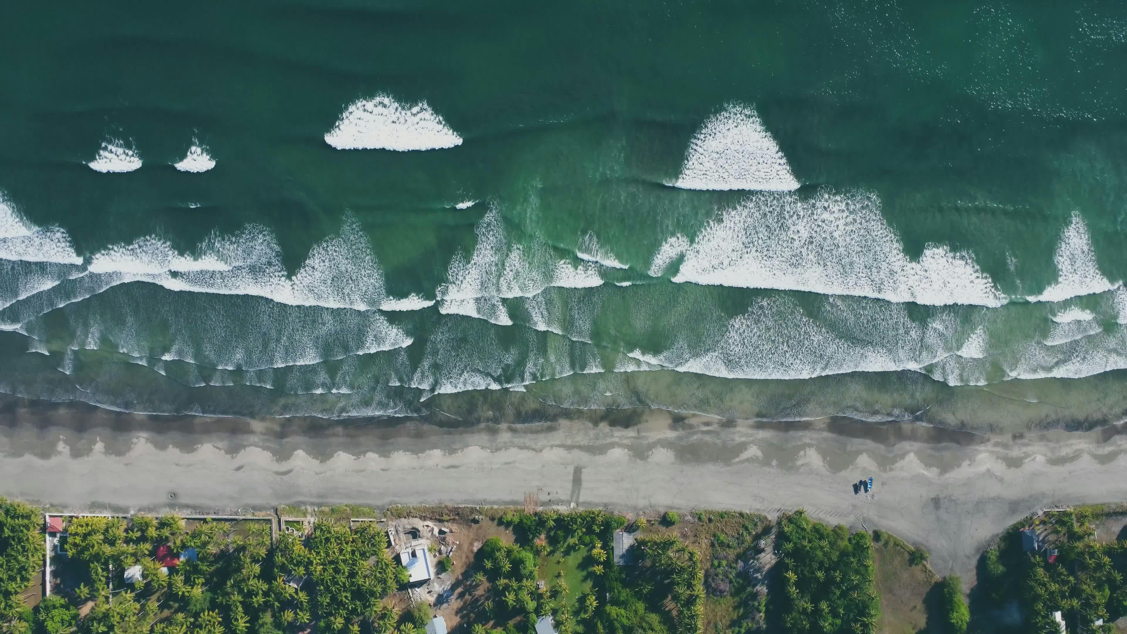 Aerial View of Ocean Waves on Sandy Shoreline Free Stock Video Footage ...