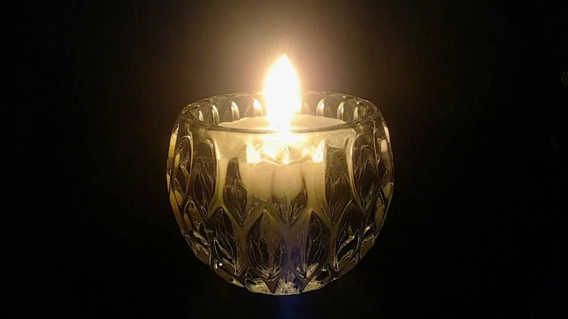 Close-up Footage Of A Burning Candle Giving Light In Darkness Free ...