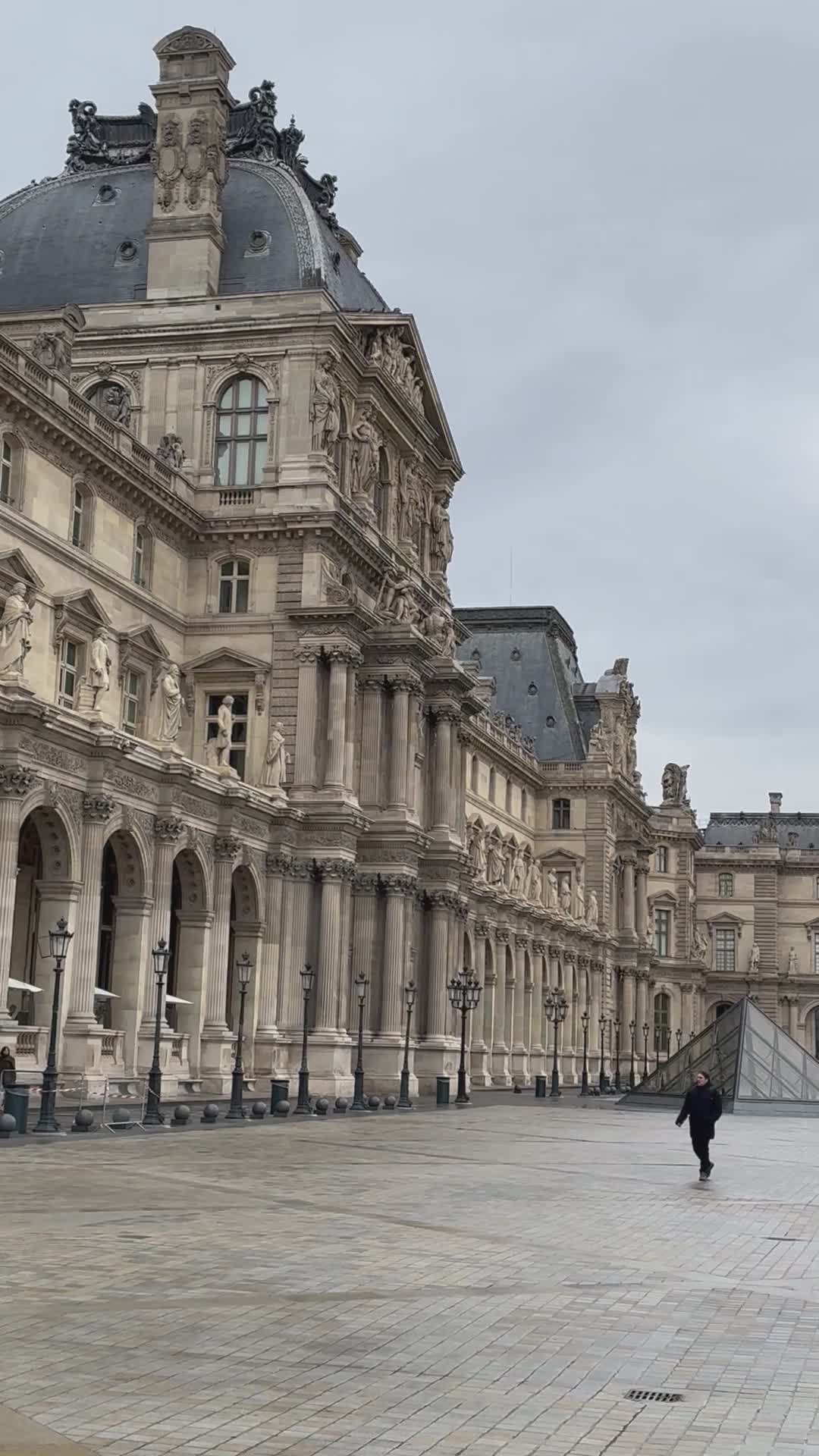 Iconic Louvre Pyramid under Overcast Skies Free Stock Video Footage ...