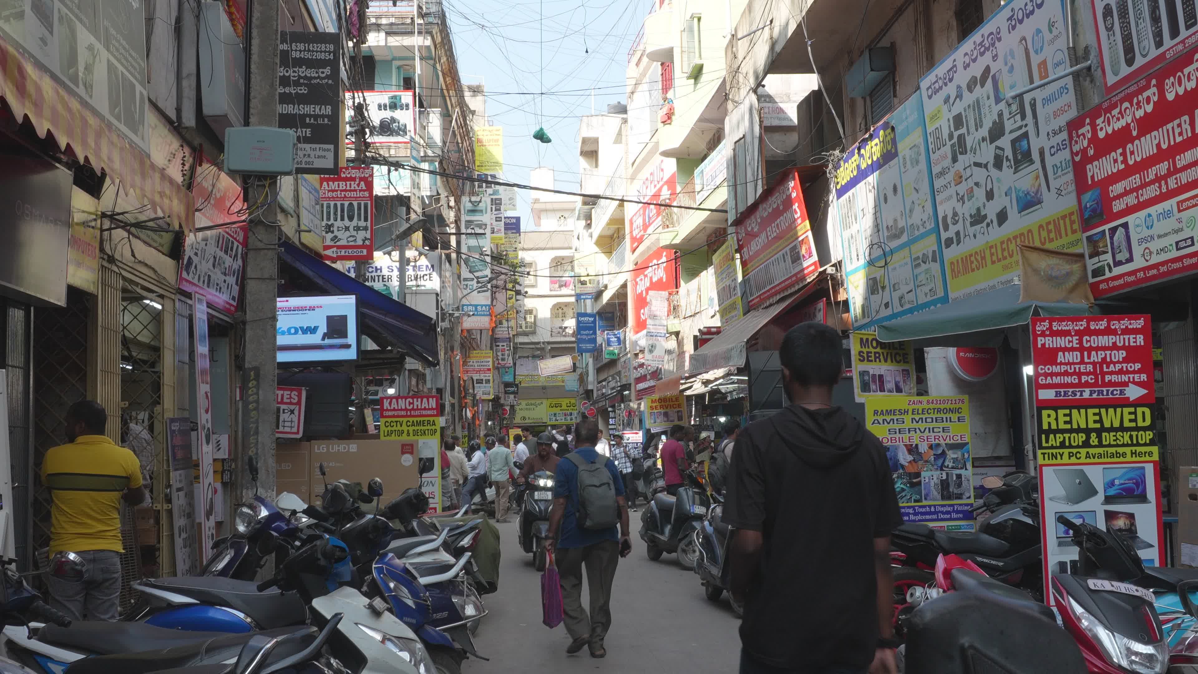Busy Street Market with Shops and Signs Free Stock Video Footage ...