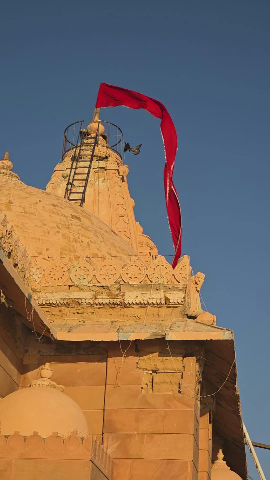 Majestic Temple with Red Flag Fluttering in Wind Free Stock Video ...