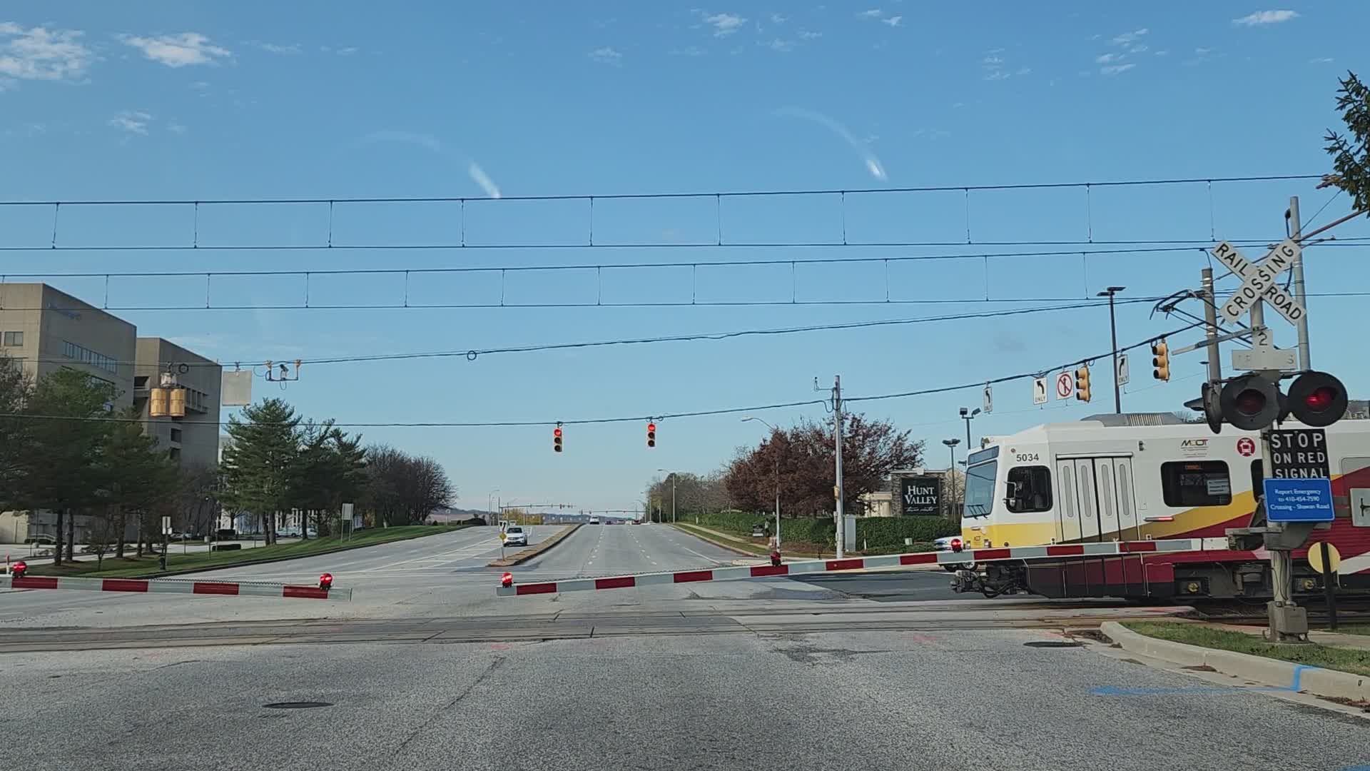 Light Rail Train Crossing Urban Intersection Free Stock Video Footage ...