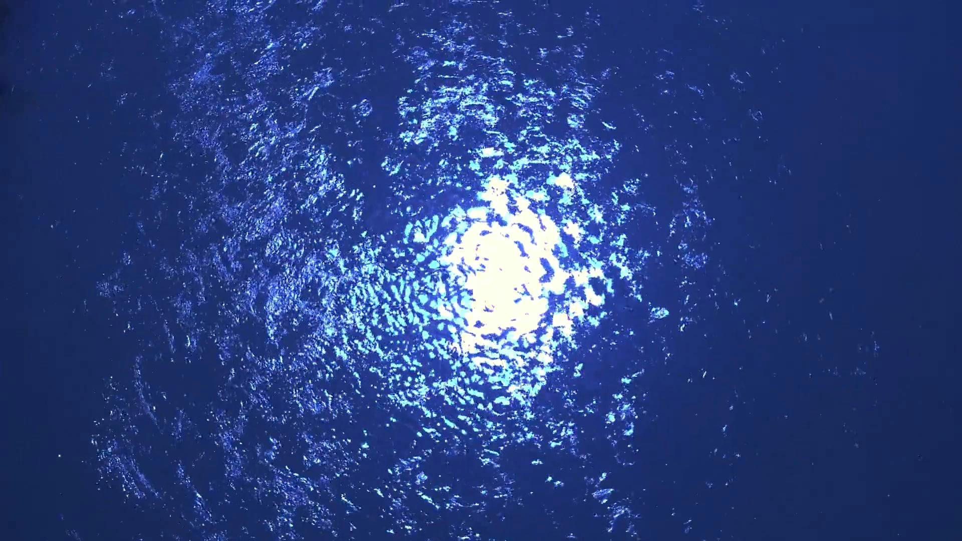 Slow Motion Footage Of Undulating Water Surface Reflecting The Light ...