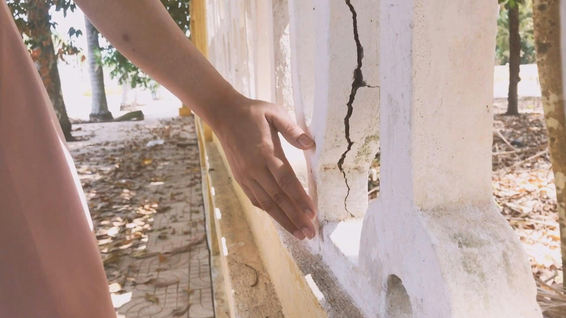 A Woman Hands Grazing The Concrete Wall Barrister While Walking · Free ...