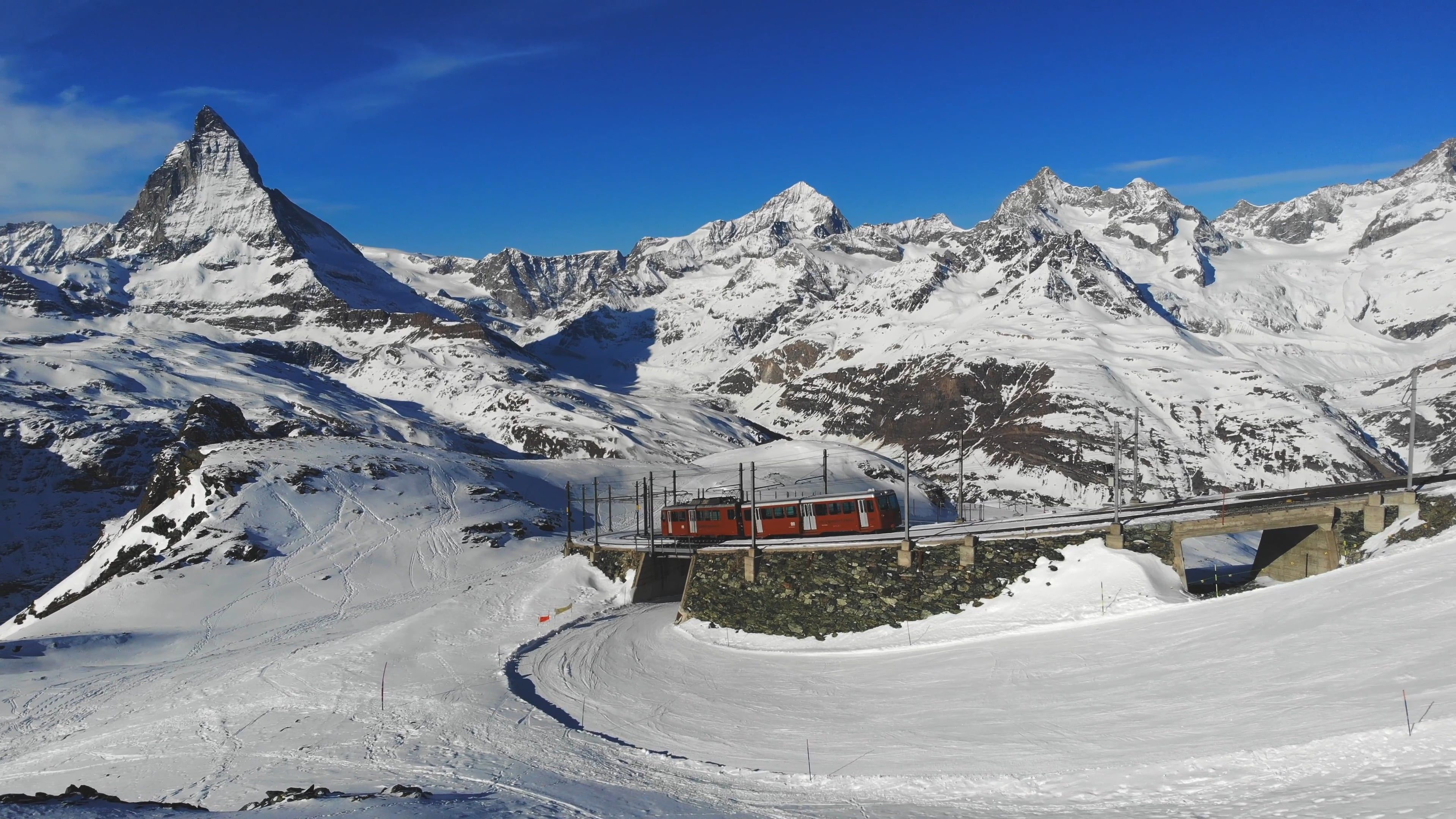 Train Transporting Public Above The Mountains Alps Of Switzerland ...