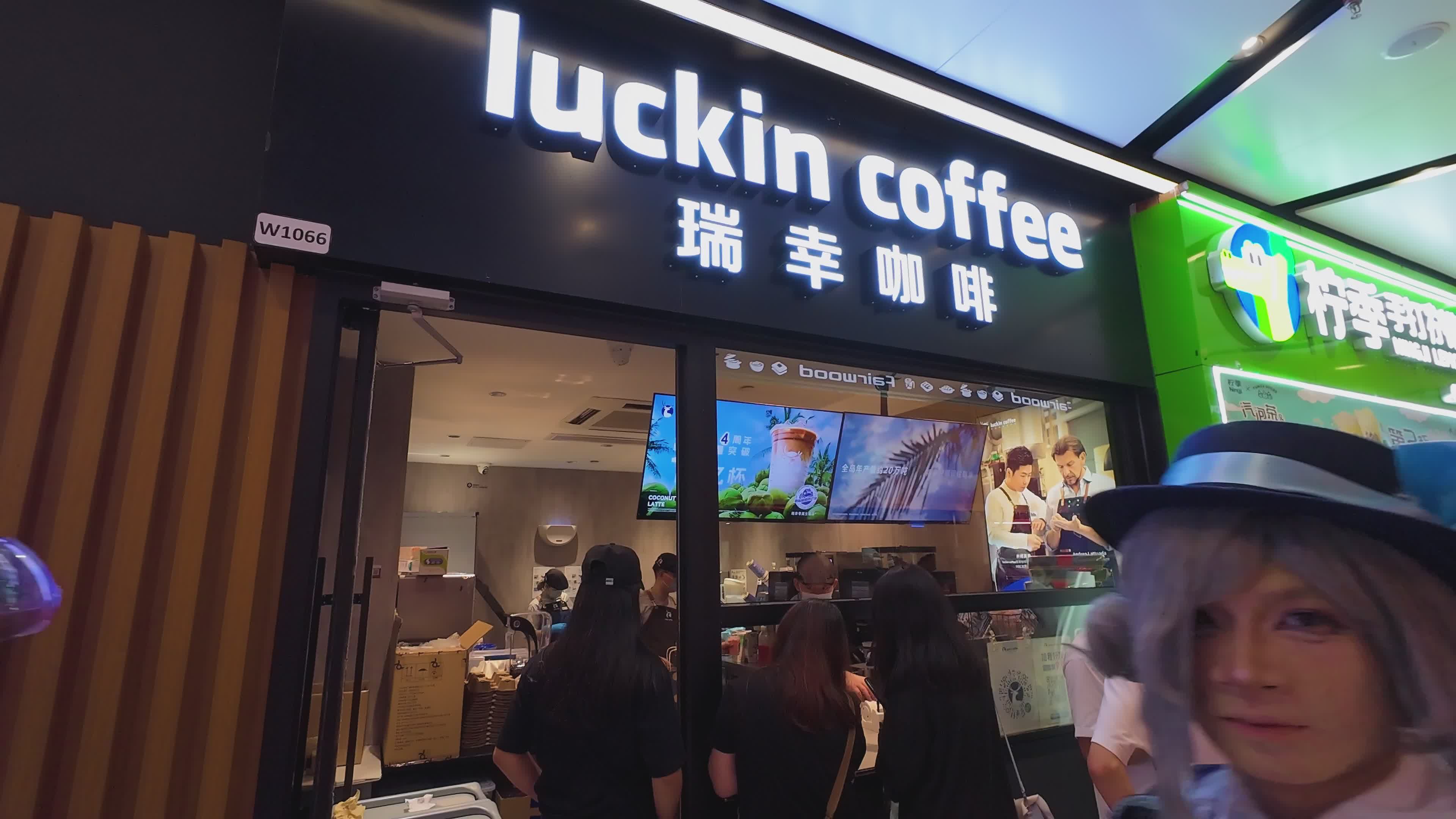 Vibrant Guangzhou Street Scene at Luckin Coffee Free Stock Video ...