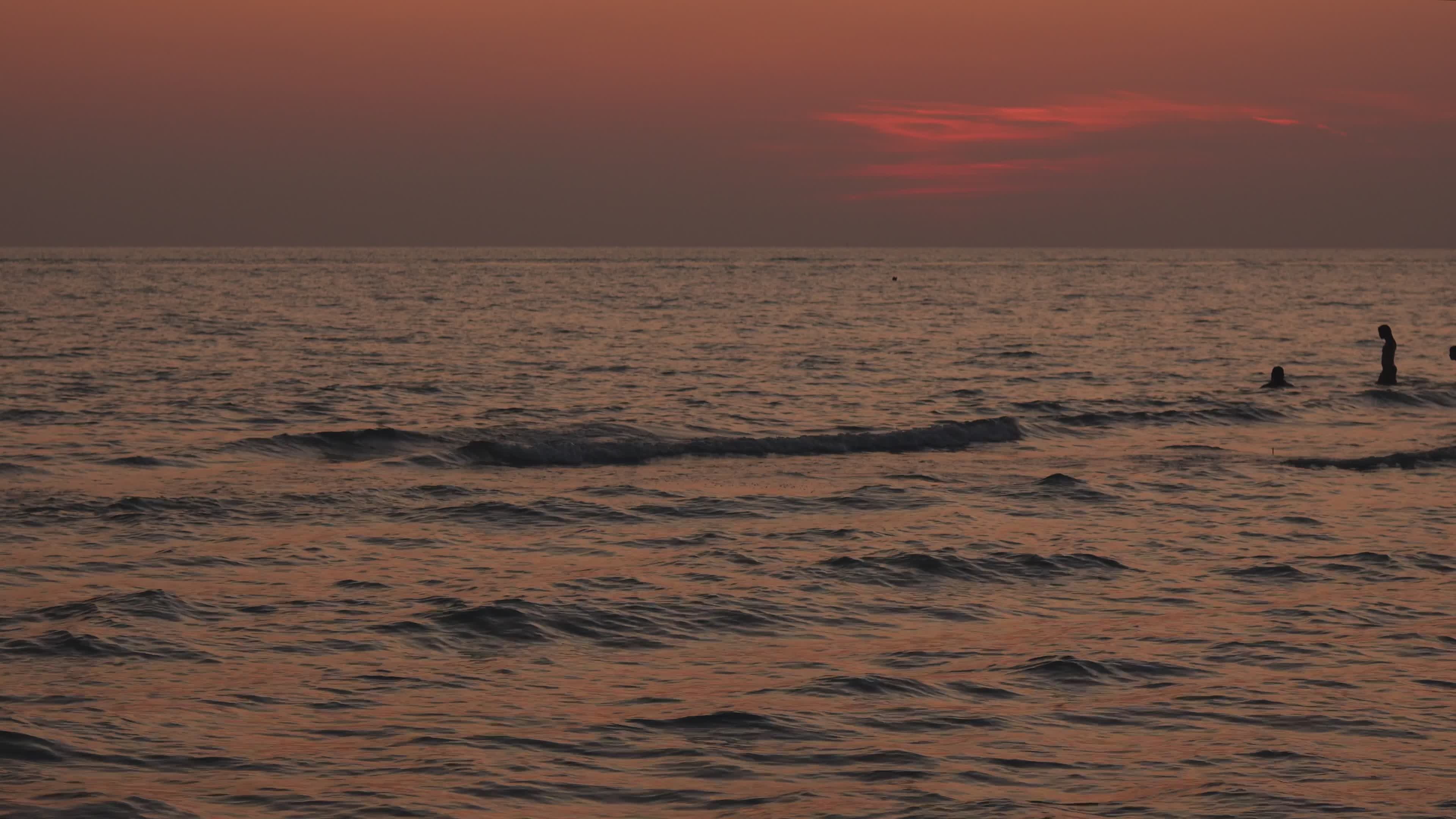 Sunset at Italian Beach with Swimmers Free Stock Video Footage, Royalty ...