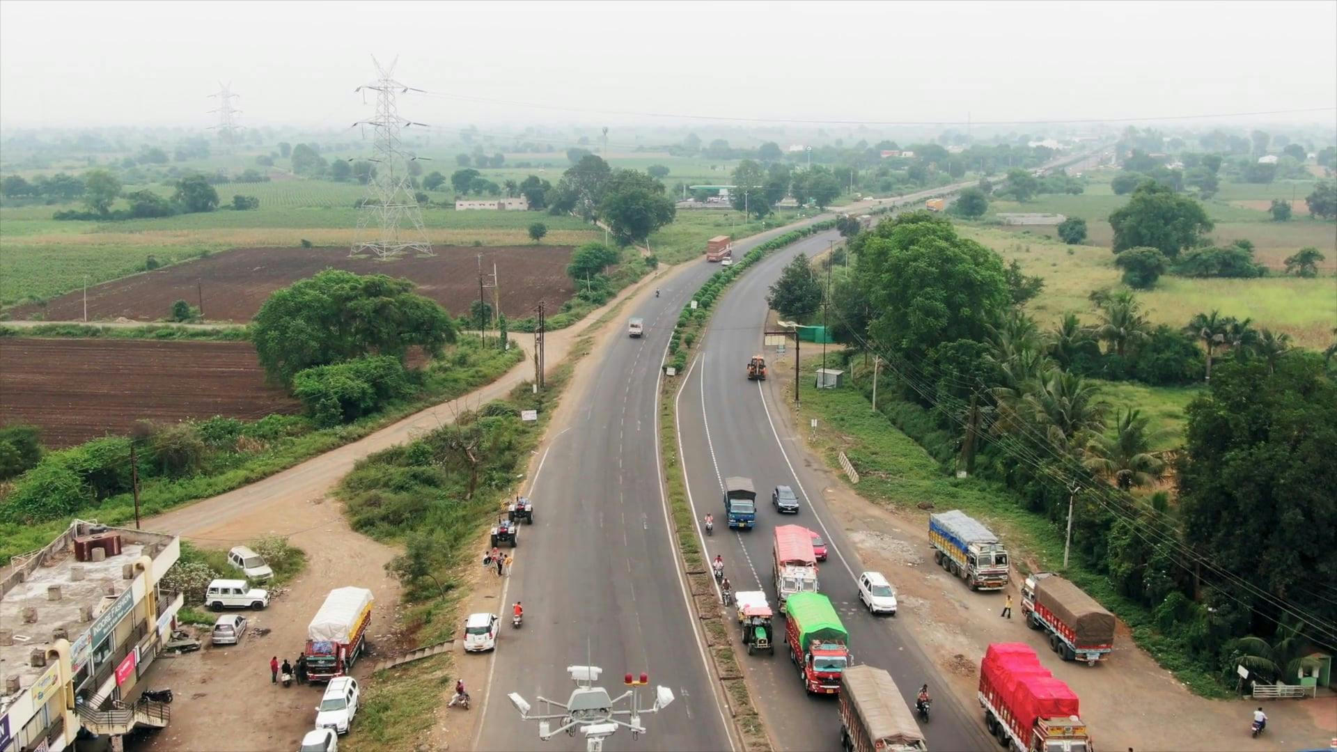 Aerial Footage Of The Road With Vehicle Passing By Free Stock Video ...