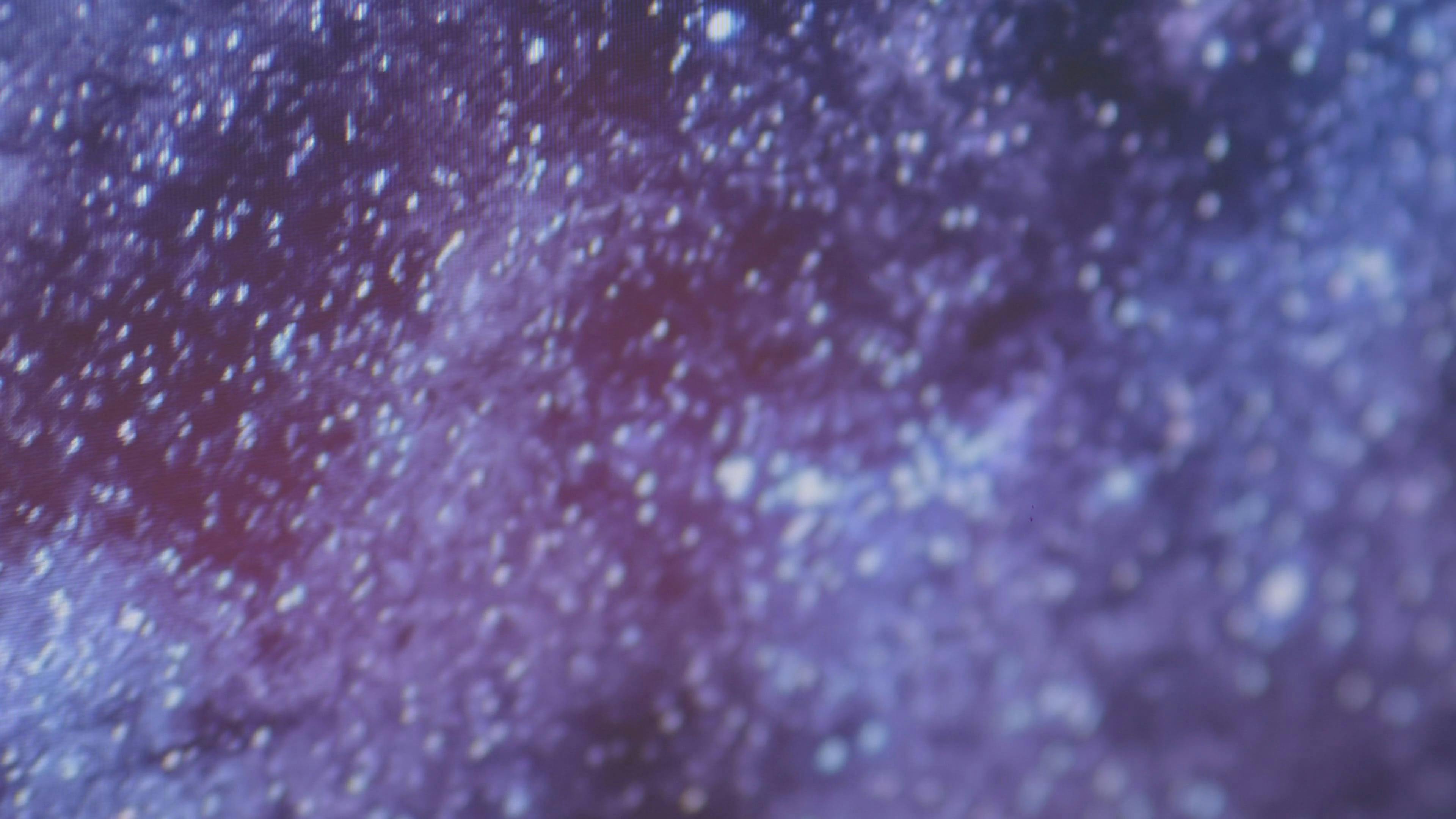 Glitters On The Surface Of An Unidentifiable Object · Free Stock Video