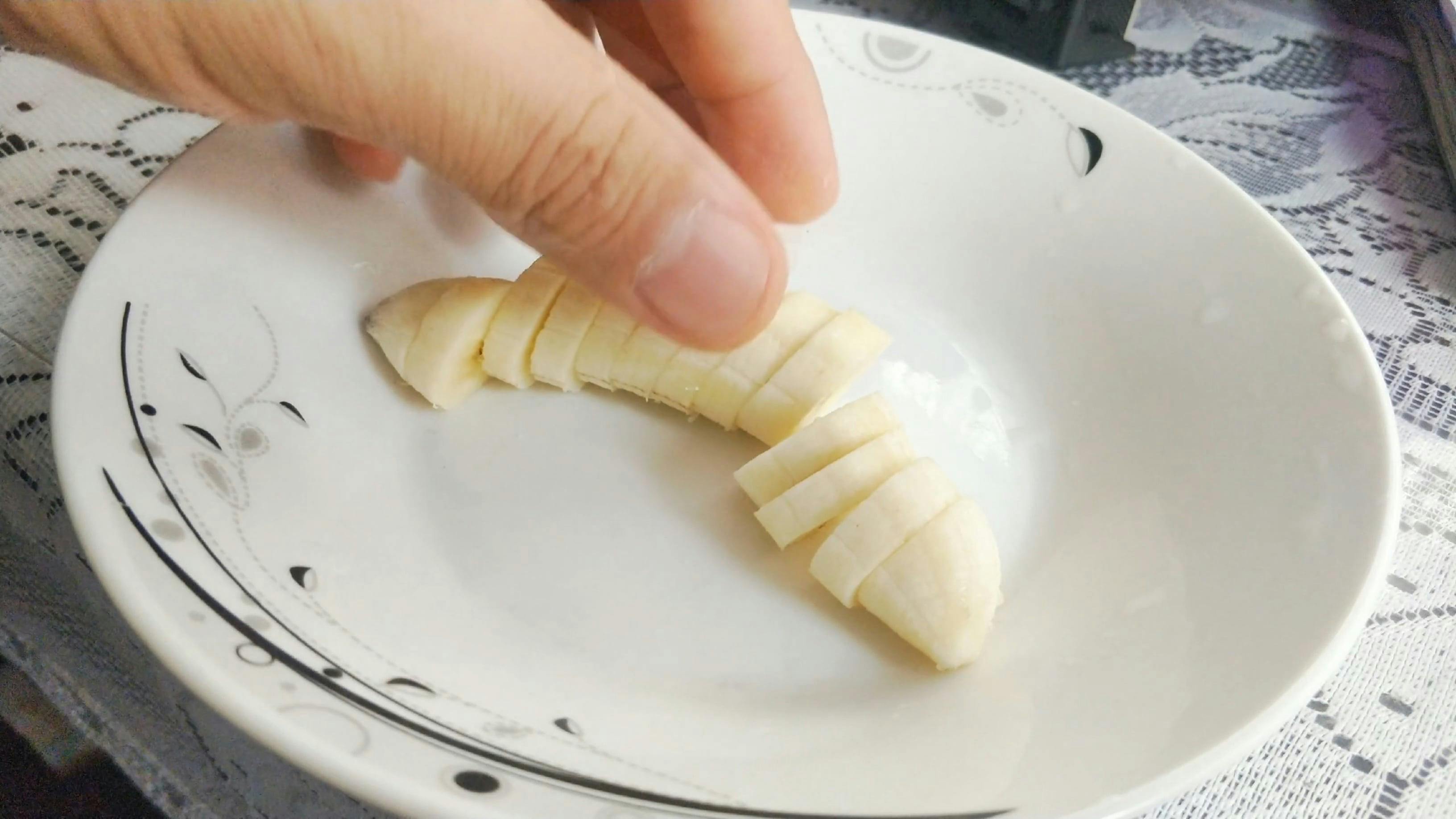 Sliced Banana On A Plate · Free Stock Video