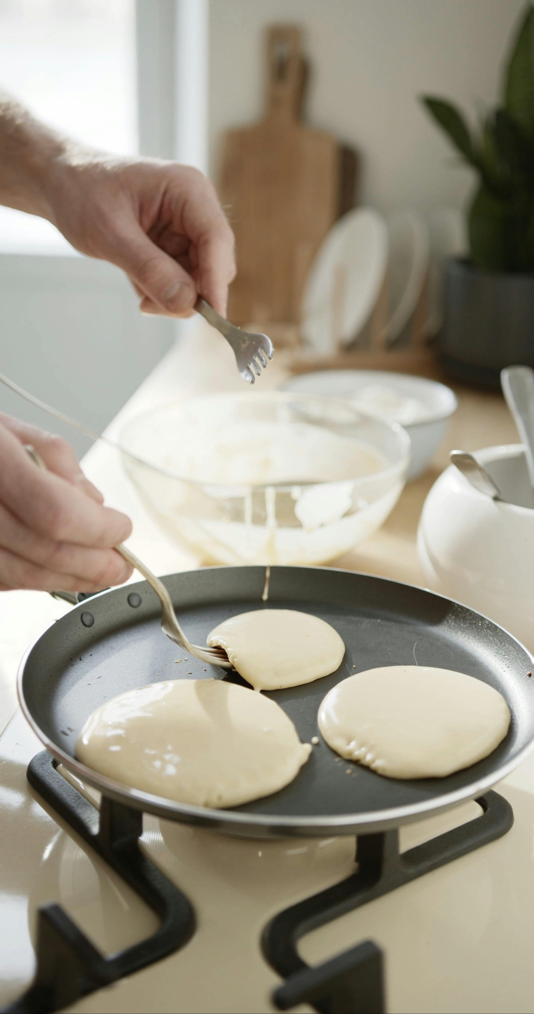 Flipping A Pancake From The Pan Using Fork · Free Stock Video