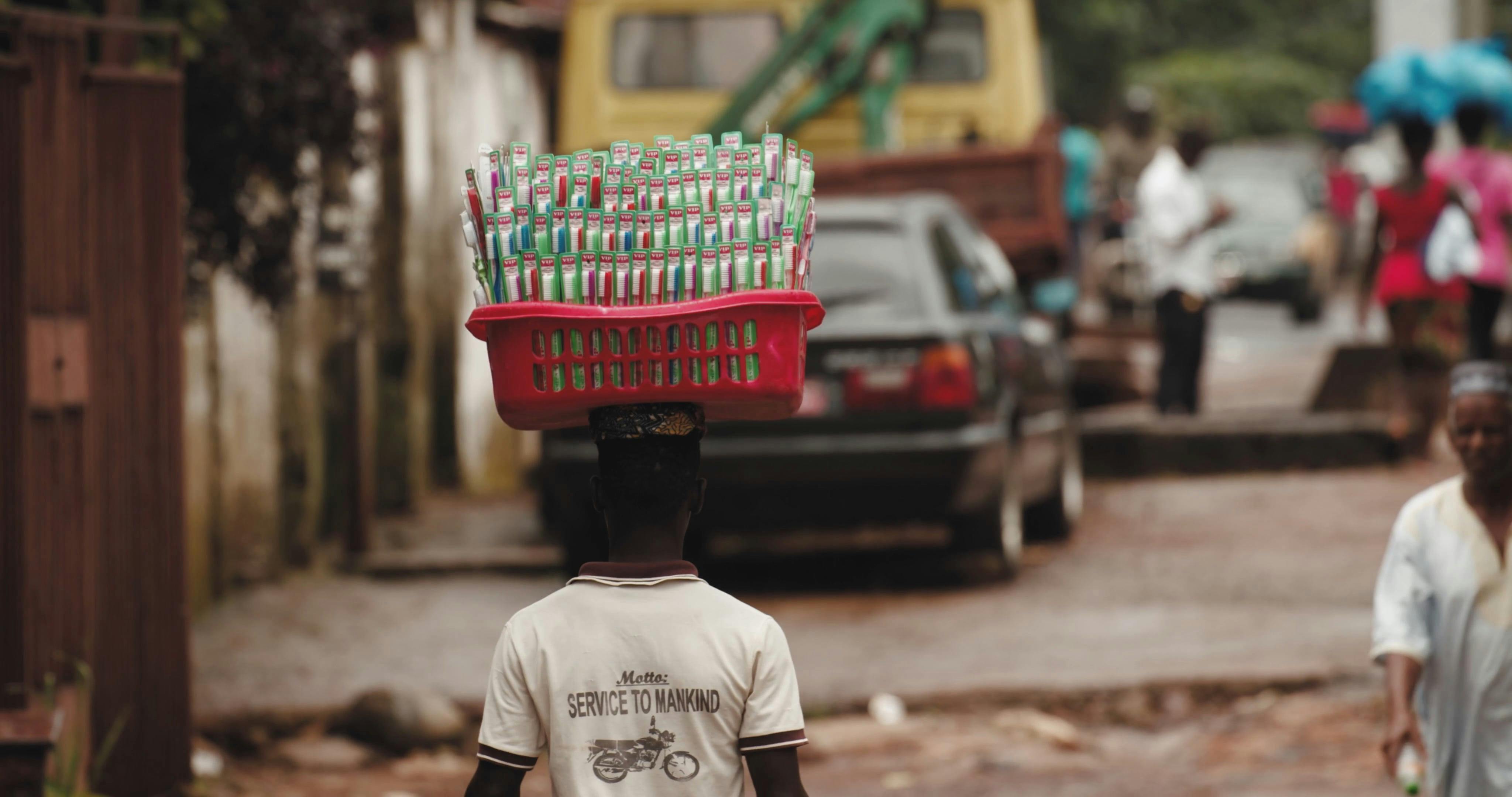 Slow Motion Footage Of A Man Carrying Something On His Head Free Stock ...
