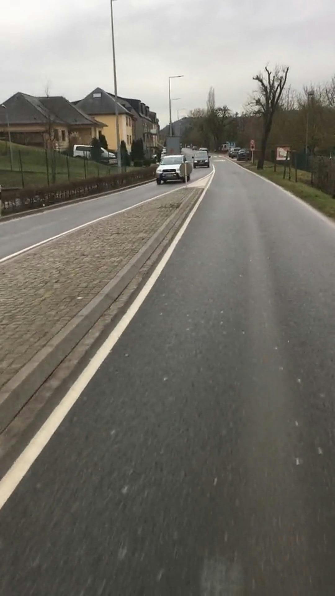 Daylight Traffic On A Camera Angled Tilt Road Free Stock Video Footage ...