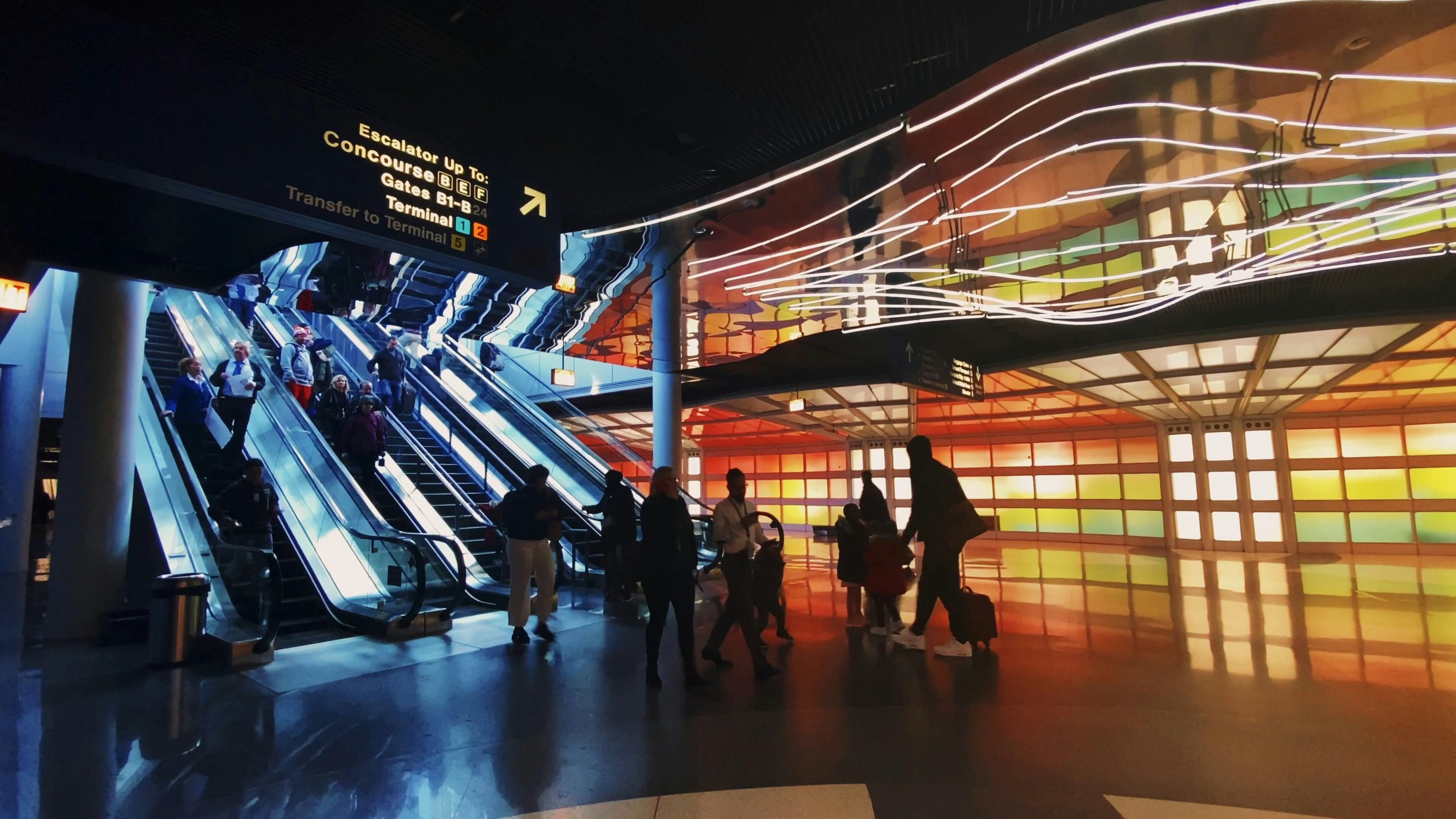 Passengers Exiting The Terminals Using The Escalators · Free Stock Video