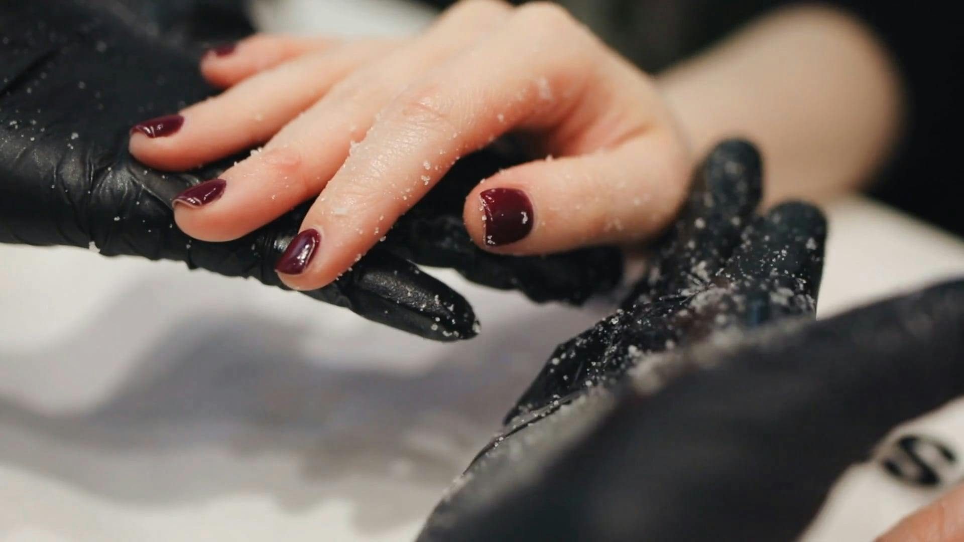 Rubbing Salt On A Customer Hand As Part Of A Hand Spa Treatment Free ...