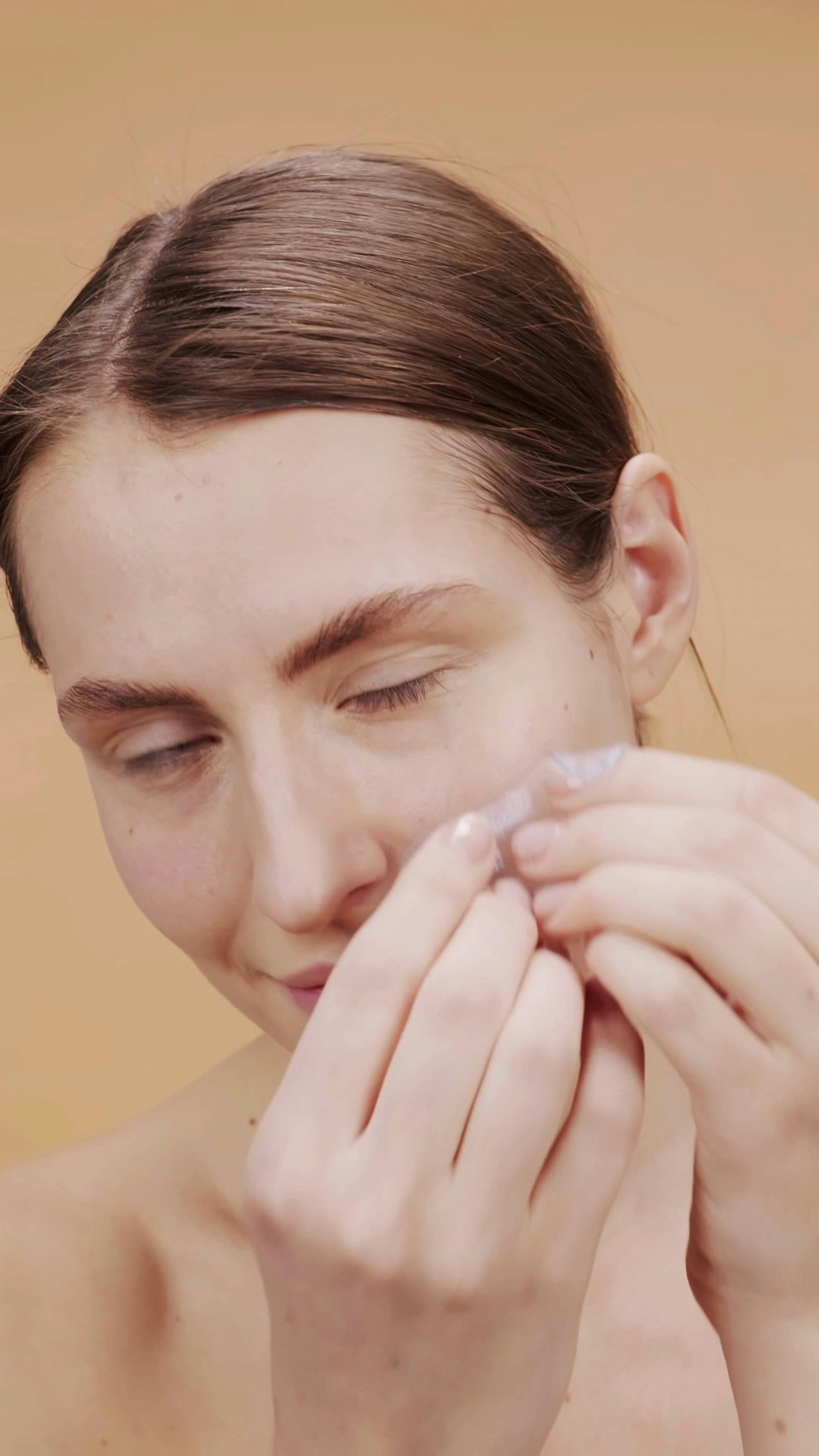 Woman Applying Under Eye Mask Free Stock Video Footage, Royalty-Free 4K ...