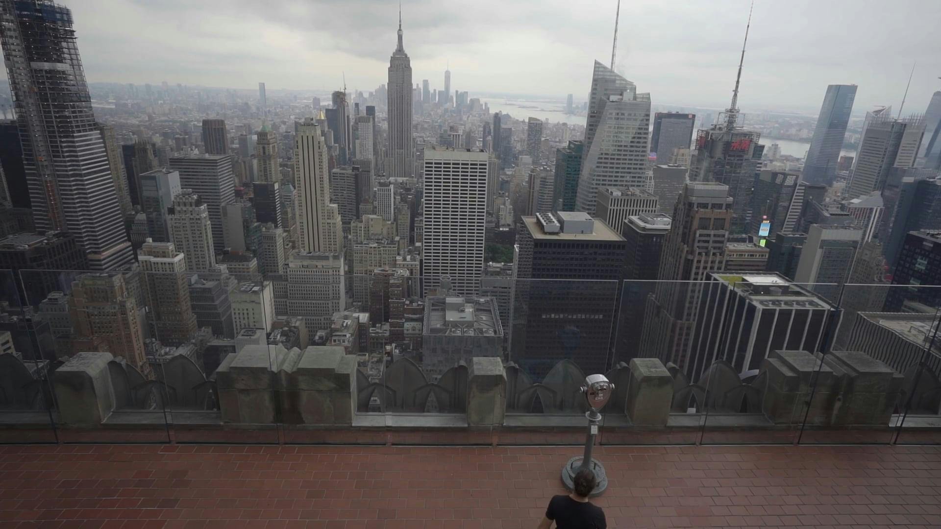 People On A Building Observation Deck To Enjoy The View Of The City ...
