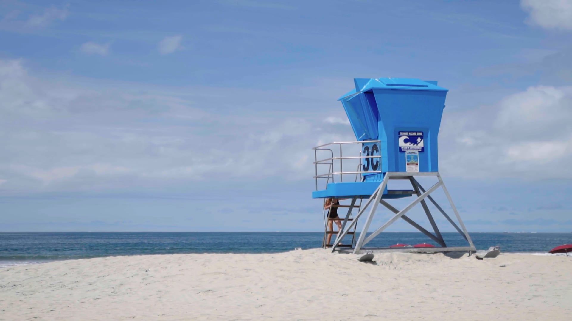 Woman Takes A Photo Of The Sea In The Life Guard Tower Free Stock Video ...