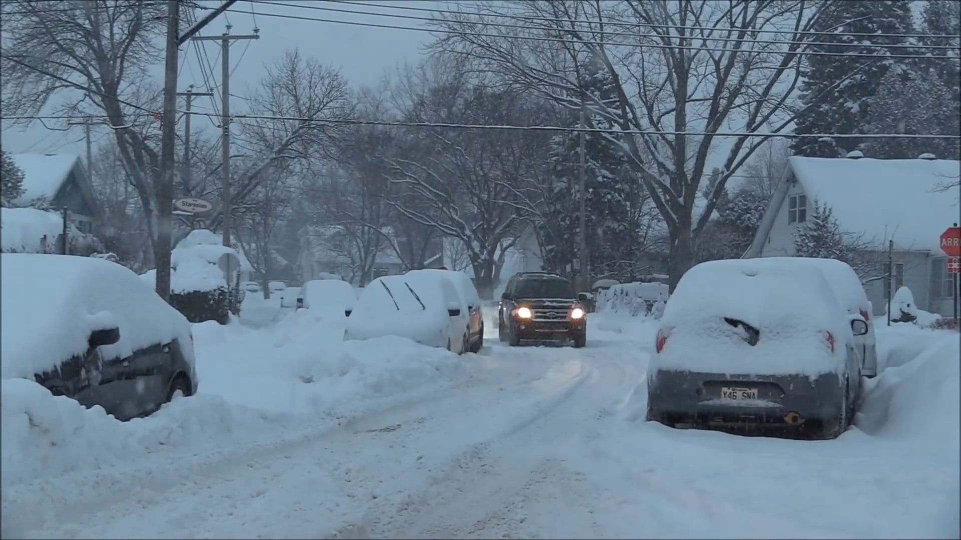 Driving In The Street Covered In Heavy Snow Fall · Free Stock Video