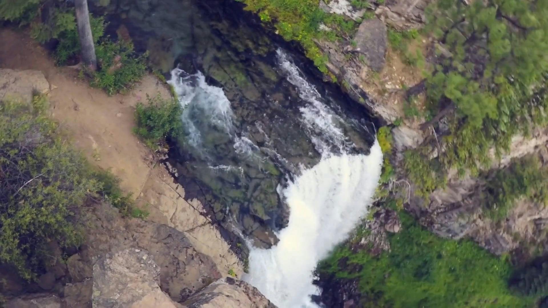 Top View Footage Of The Water Falls And The Mountain · Free Stock Video