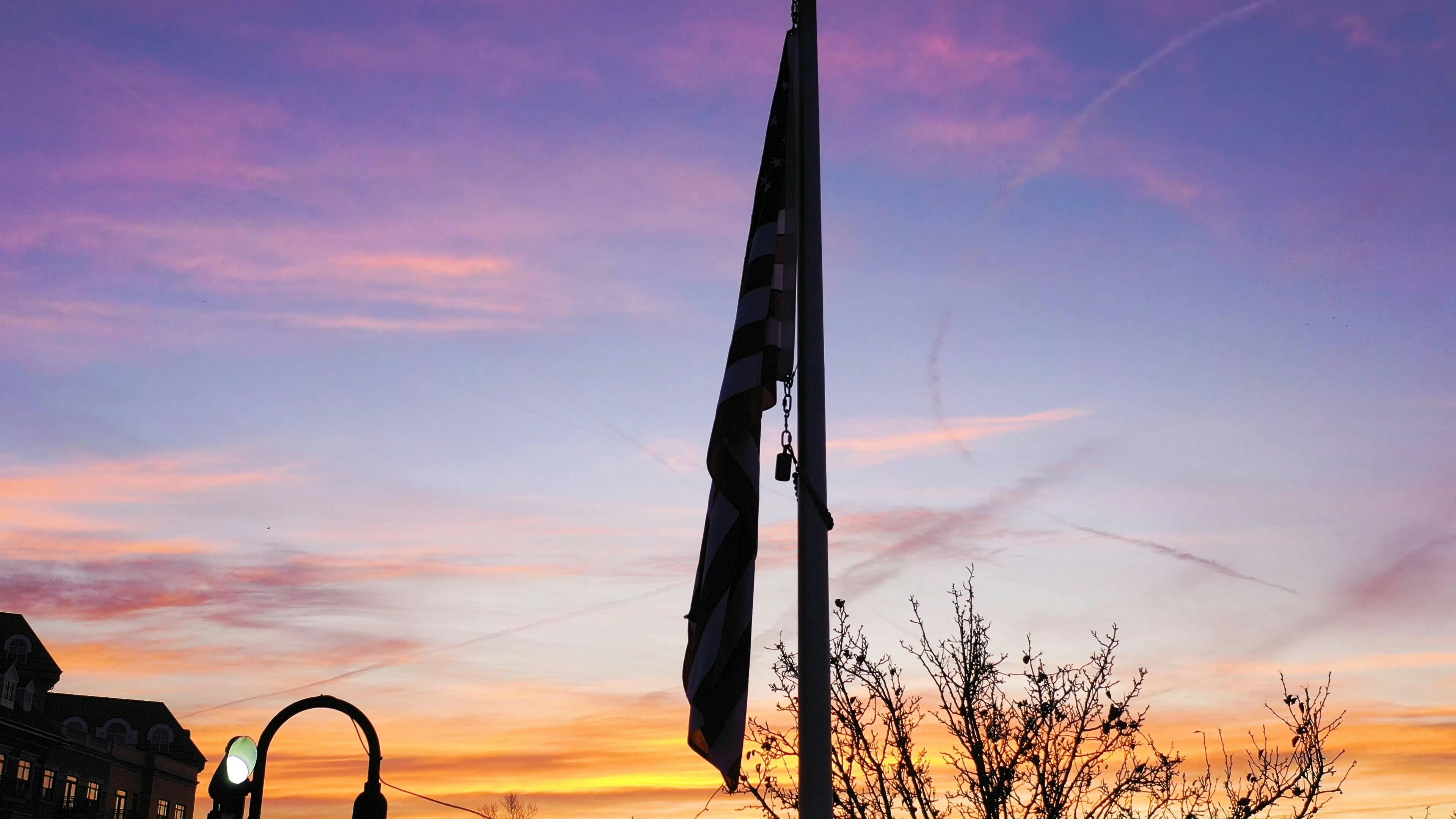 An American Flag Raised High Above The Flag Pole · Free Stock Video