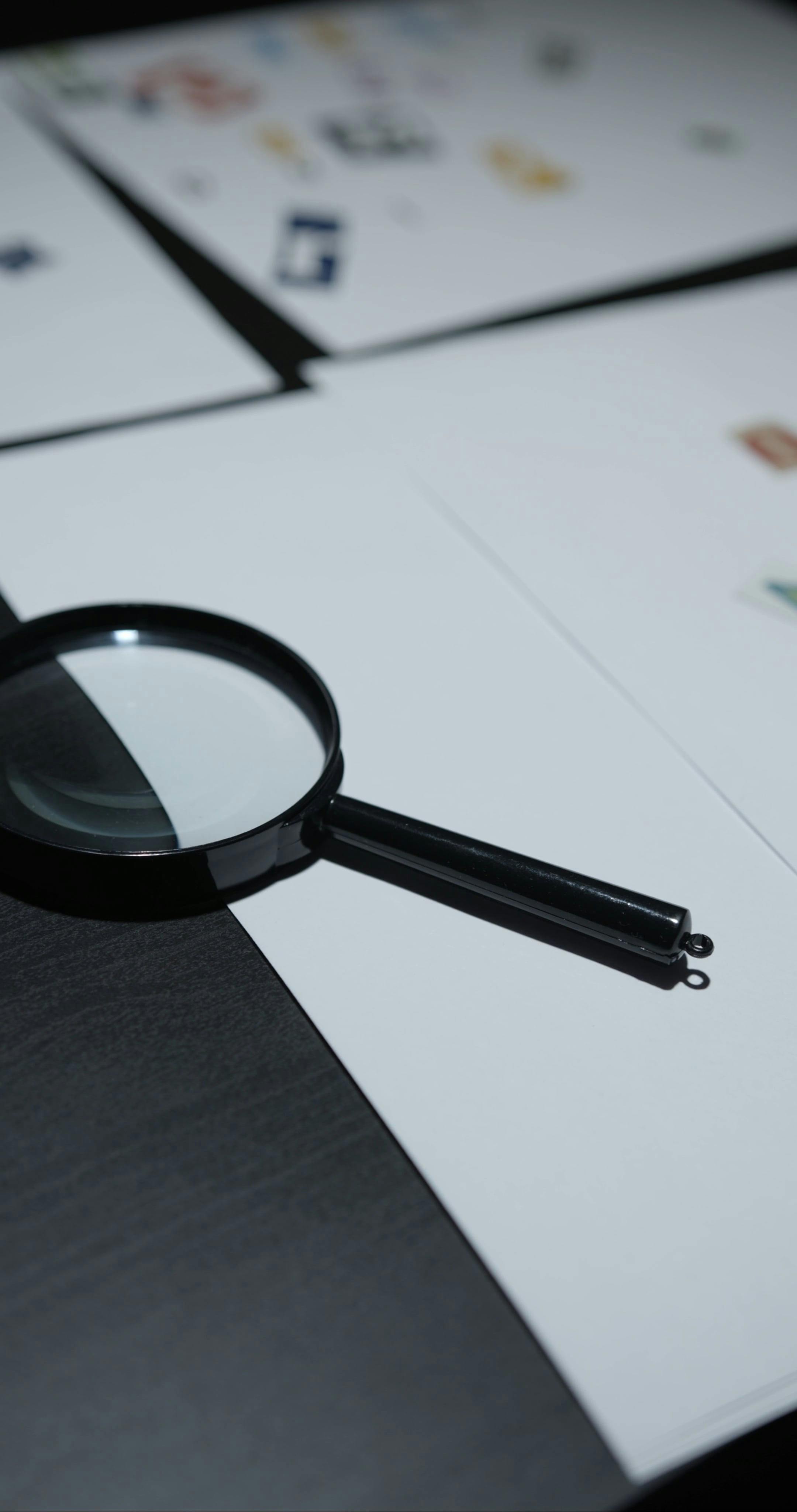 Using A Magnifying Glass To Visually Enlarge Objects · Free Stock Video