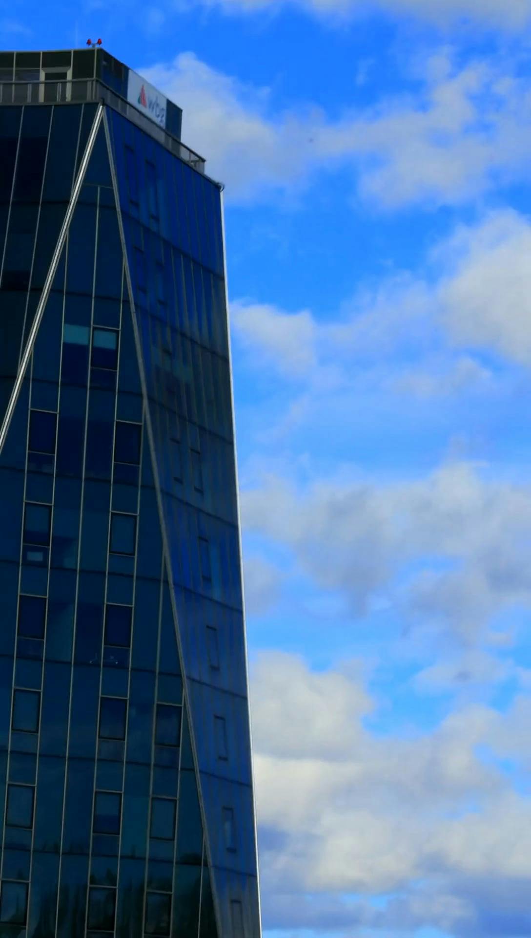 Clouds Reflection On A Building Glass Panels · Free Stock Video