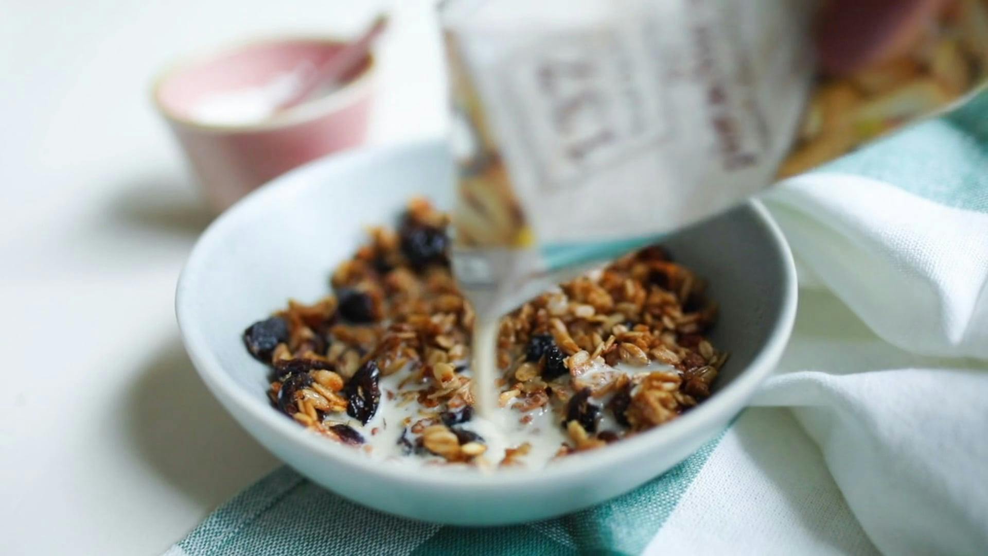 A Person Pouring Milk in a Bowl of Cereal Free Stock Video Footage ...