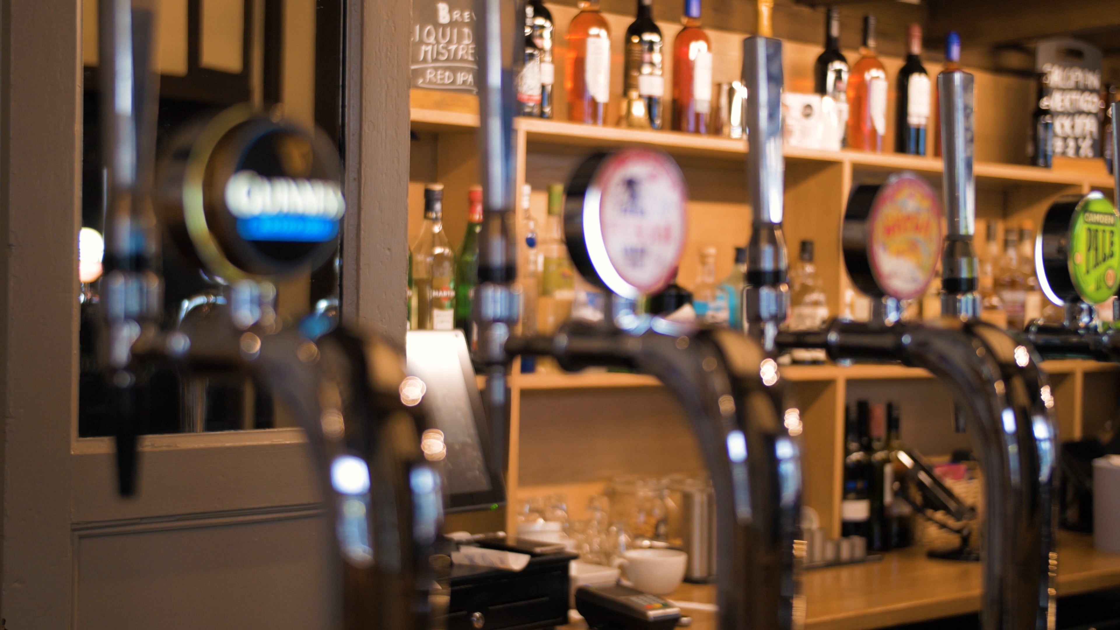 Close Up of Beer Pumps at the Bar · Free Stock Video