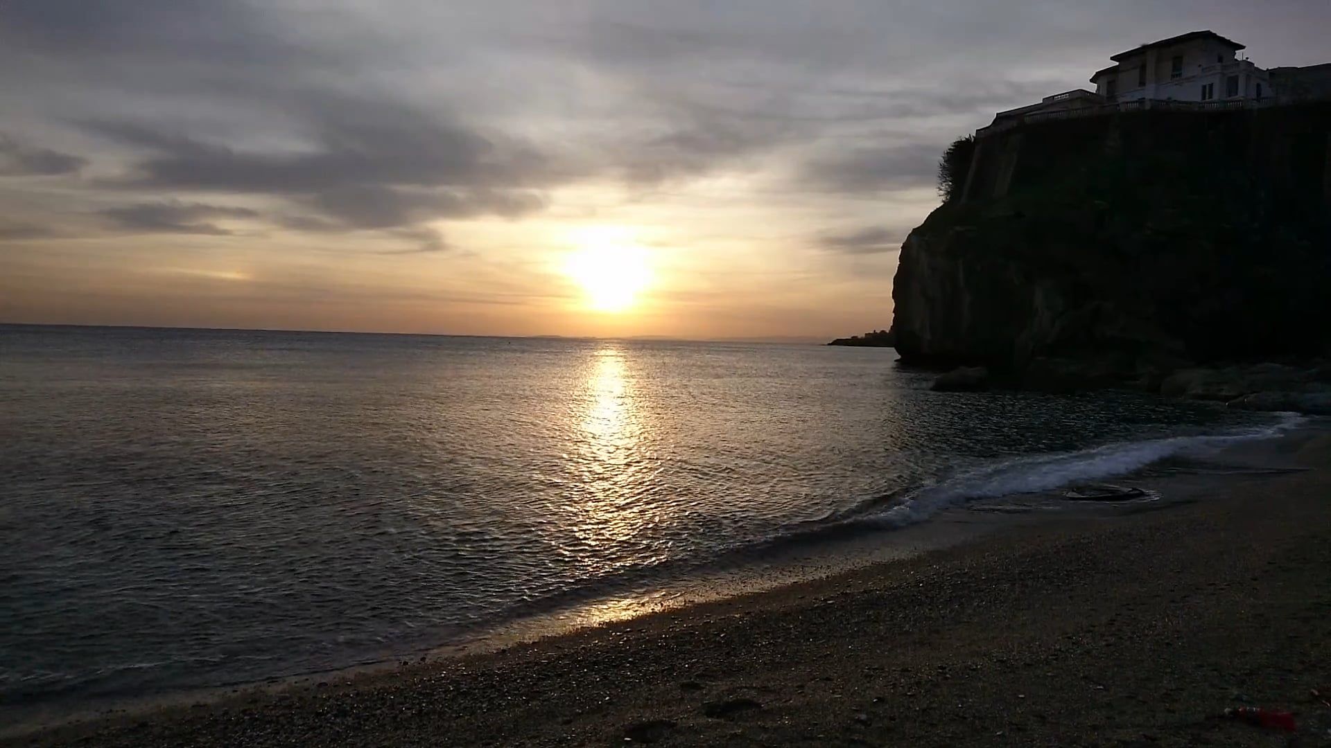 A View Of The Sunset From The Beach Shore · Free Stock Video