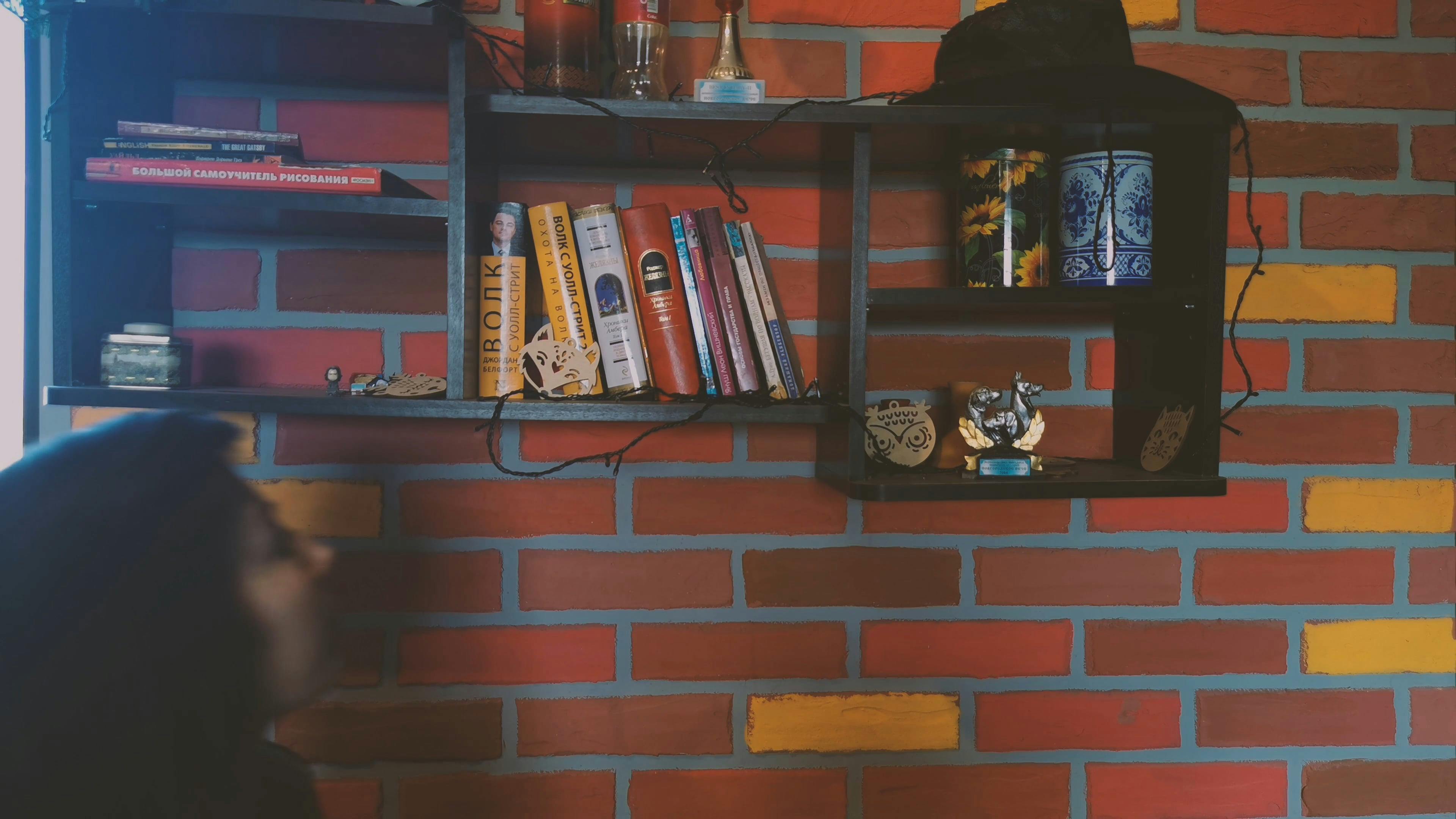 Footage Of A Woman Getting A Book In The Book Shelf · Free Stock Video