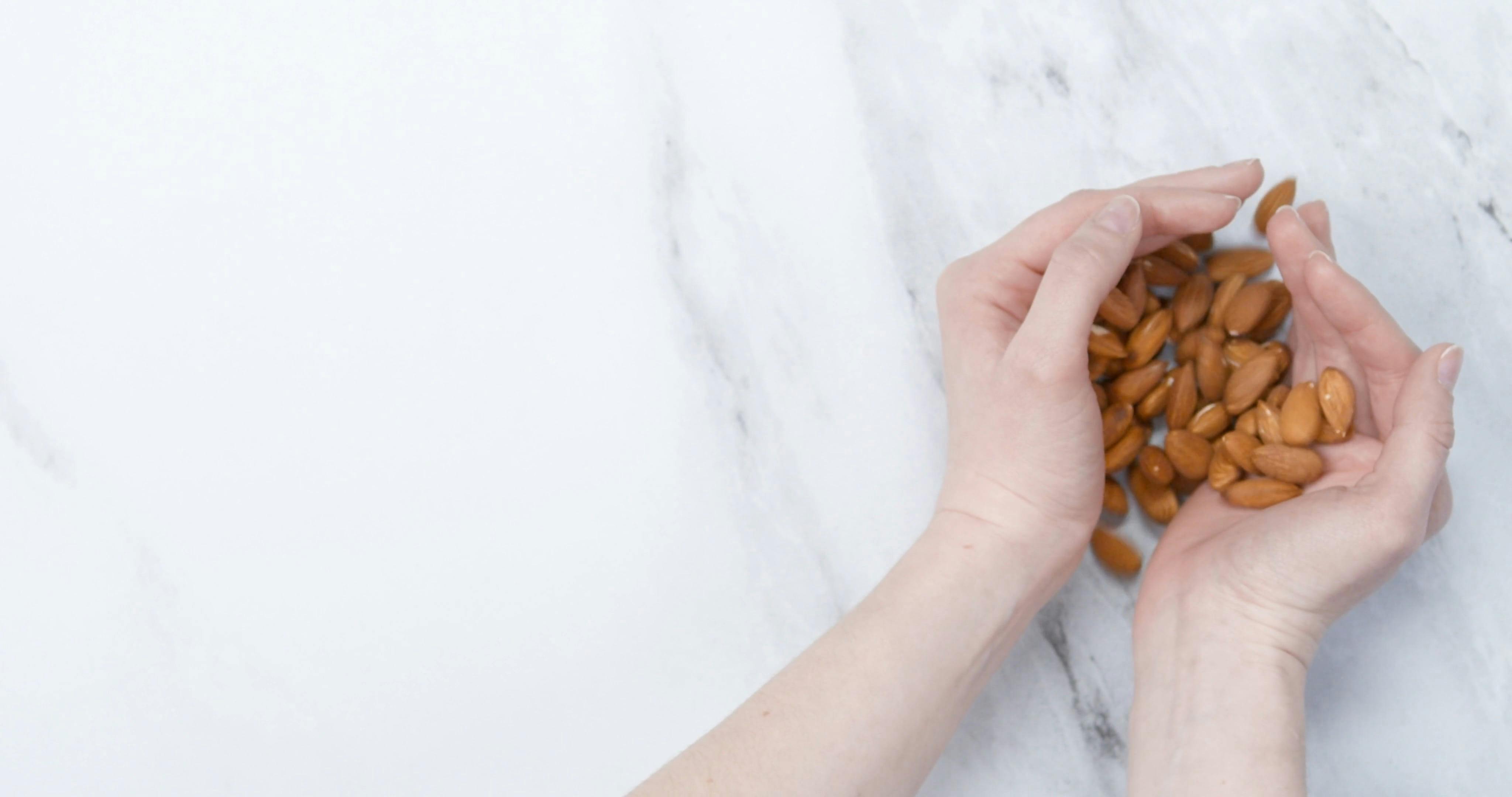 Close-Up Shot of Falling Almond Nuts Free Stock Video Footage, Royalty ...