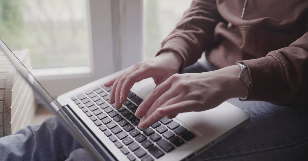 Person Typing on a Laptop · Free Stock Video Person Typing on a Laptop · Free Stock Video
