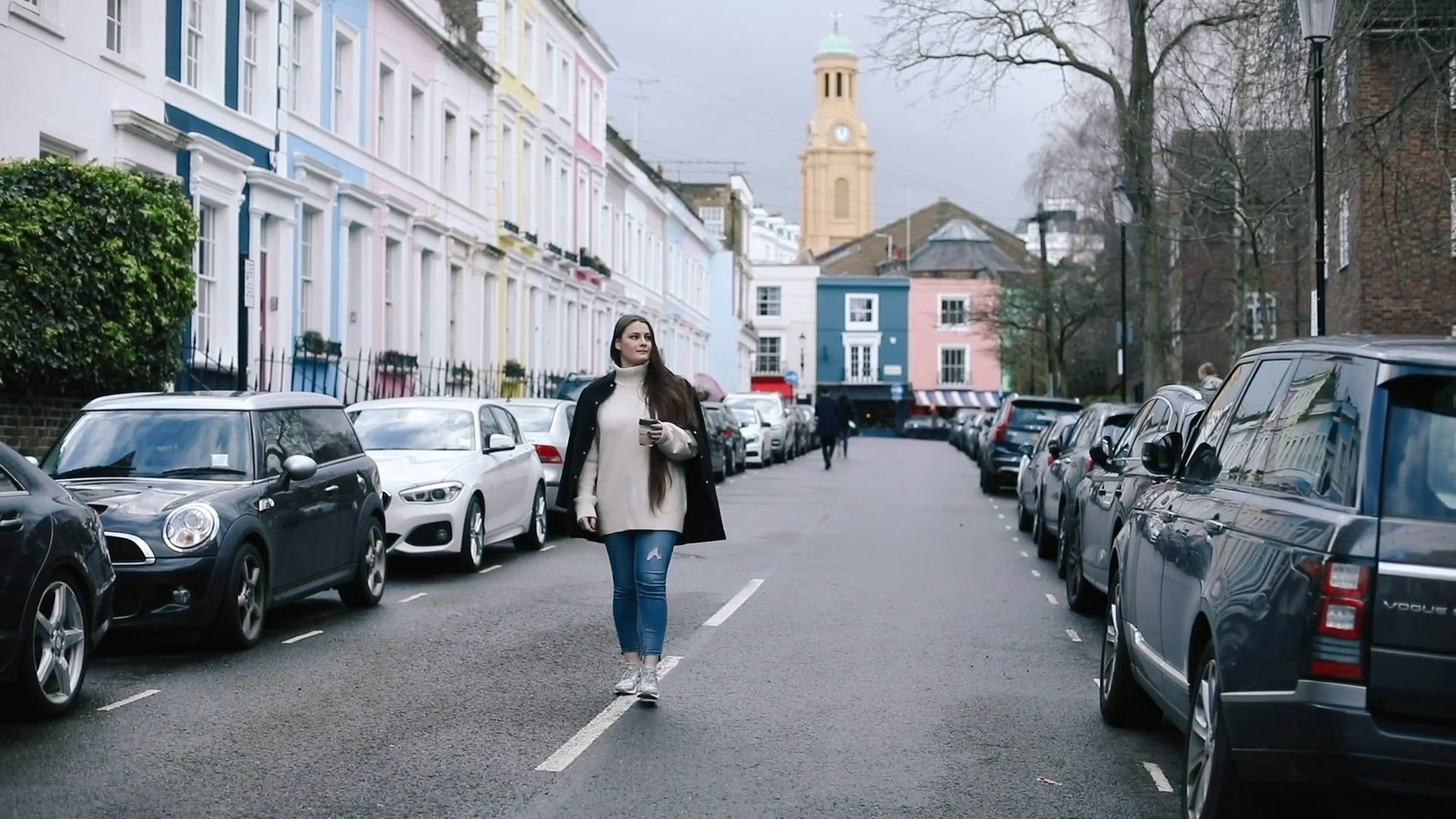 Woman Drinking Coffee While Walking on the Street · Free Stock Video