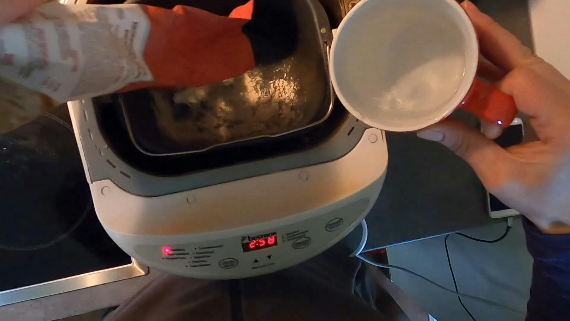 A Person Making Bread Using Bread Machine Free Stock Video Footage ...