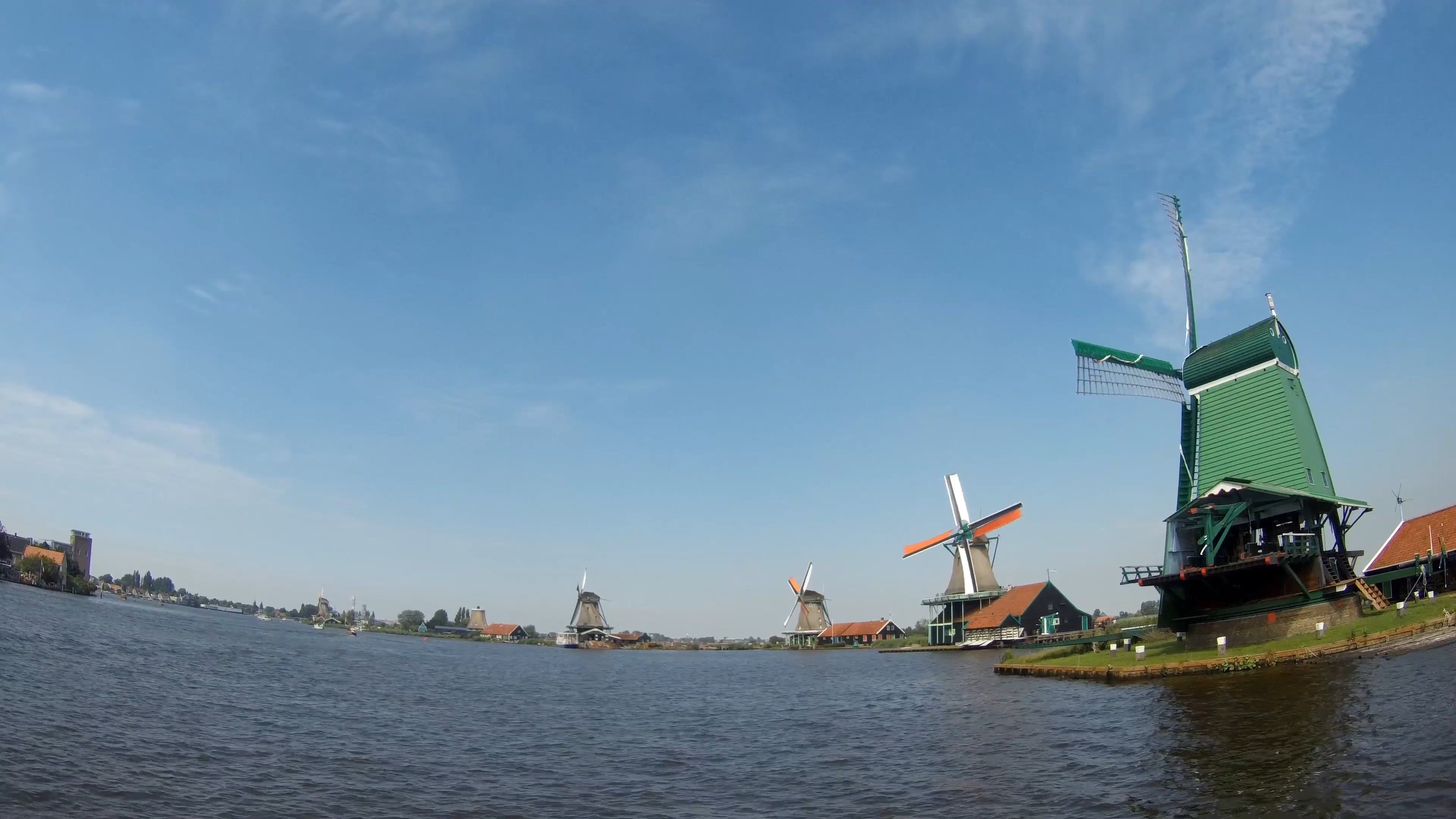 Wide Angle Shot of Windmills near a Body of Water Free Stock Video ...