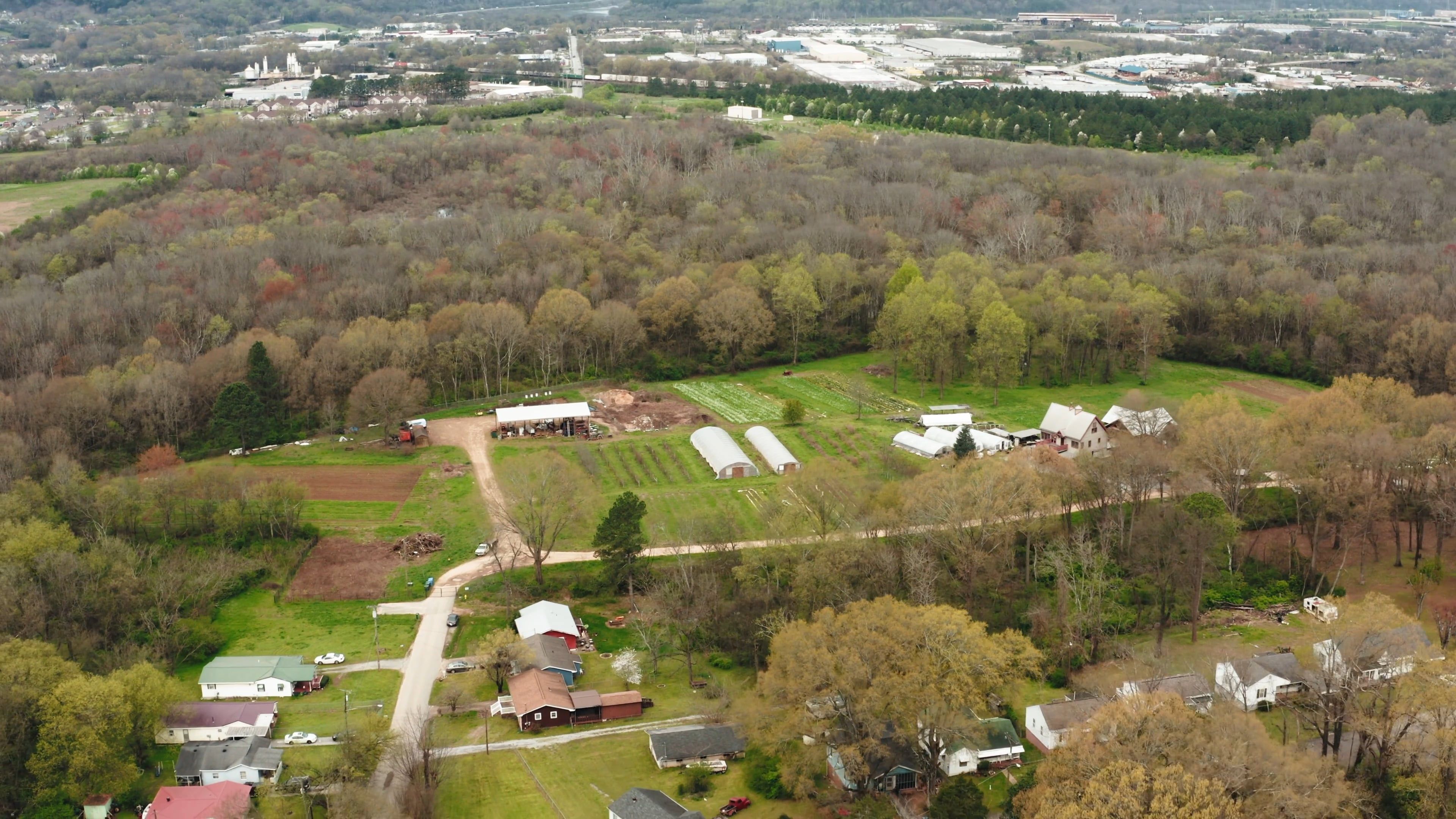 Aerial Footage Of A Town With Lush Lands And Its Landscape · Free Stock ...