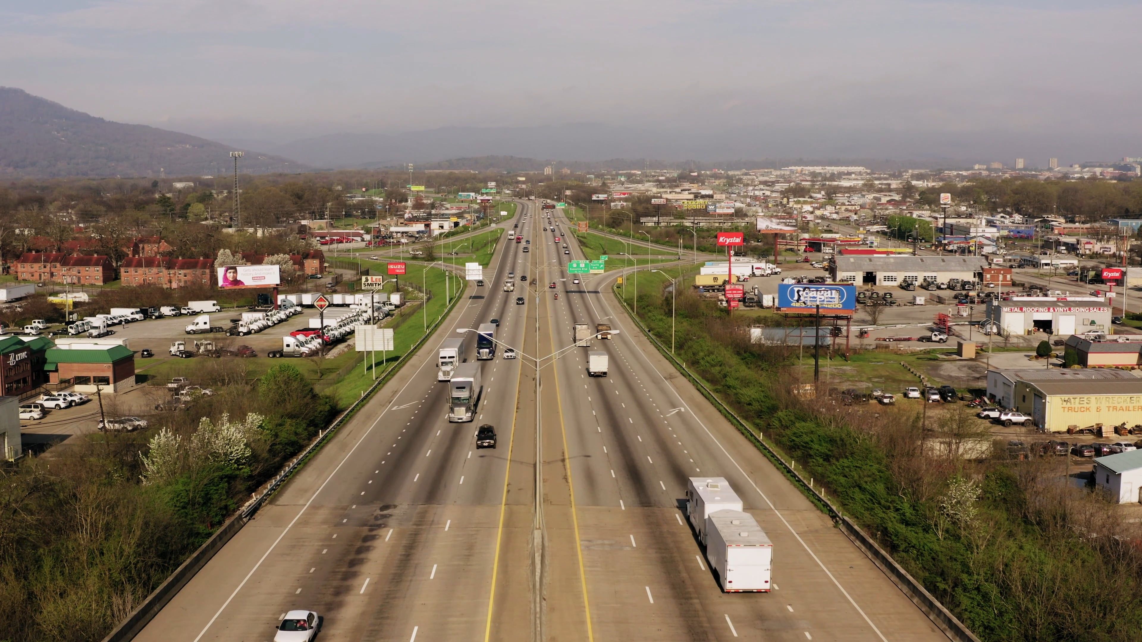 Drone Footage Of An Elevated Expressway Across A Town Free Stock Video ...