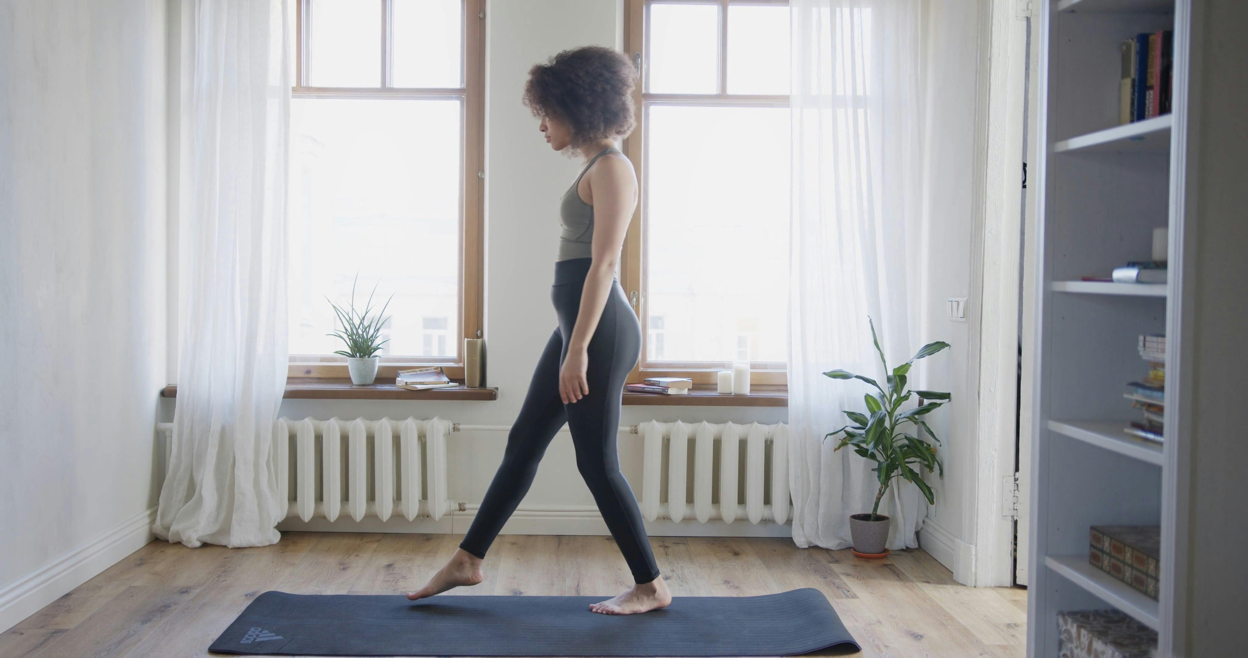 A Woman Doing Stretch Exercises At Home · Free Stock Video