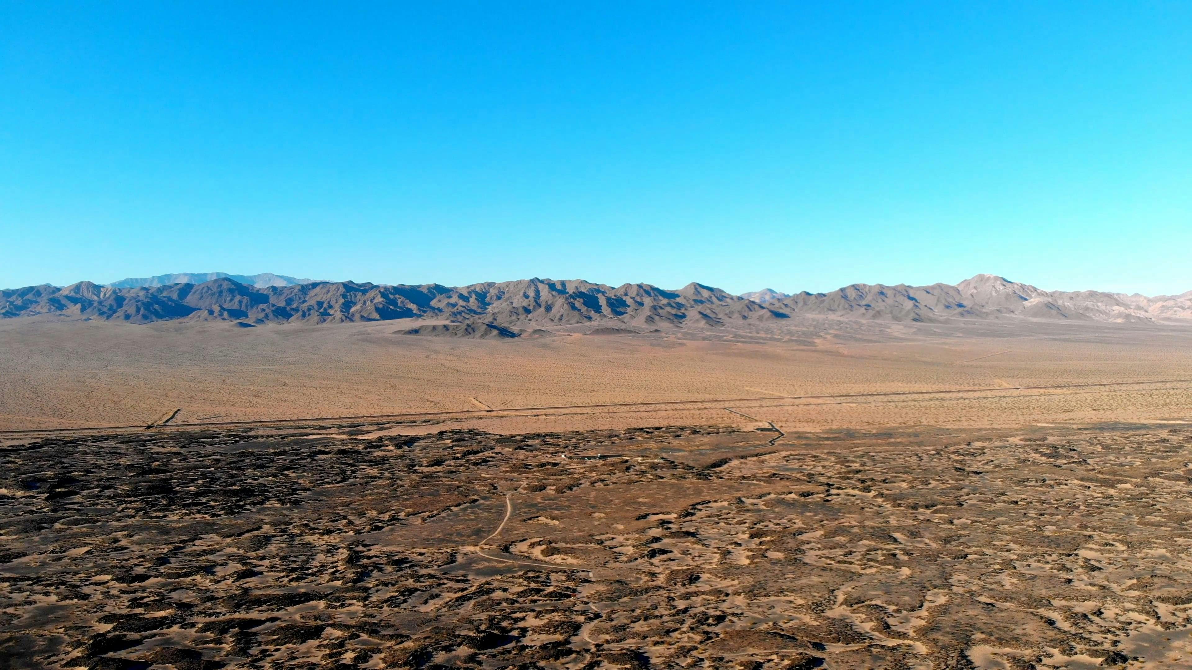 Drone Footage Of A Bare Mountain Ranges In A Desert · Free Stock Video
