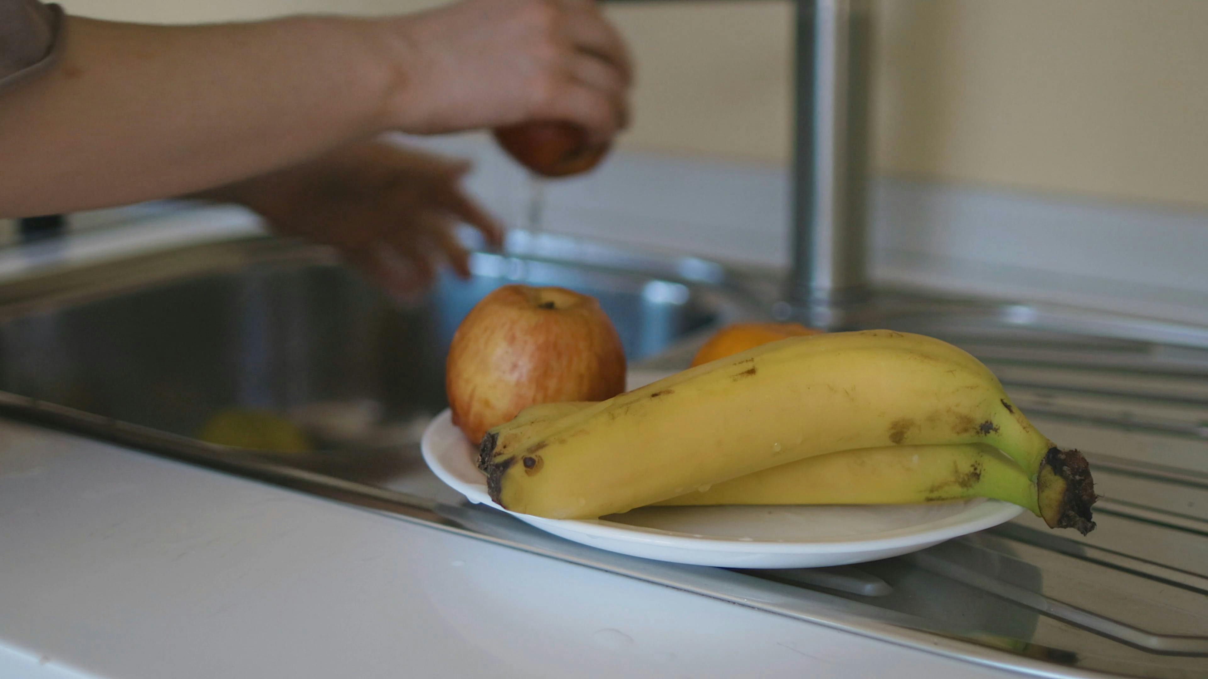 Person Washing Fruits · Free Stock Video