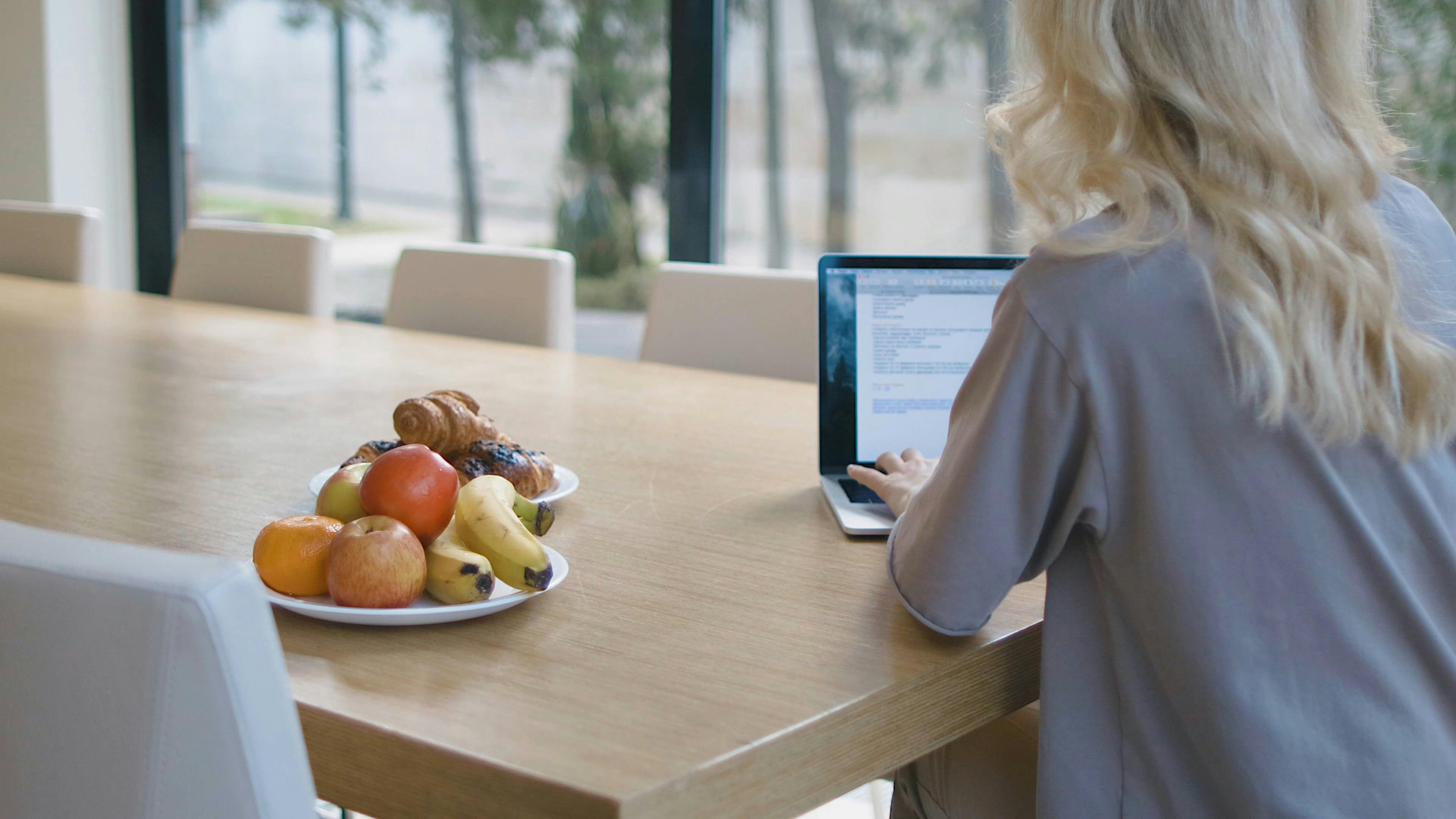 Woman Working from Home and Eating an Apple Free Stock Video Footage ...