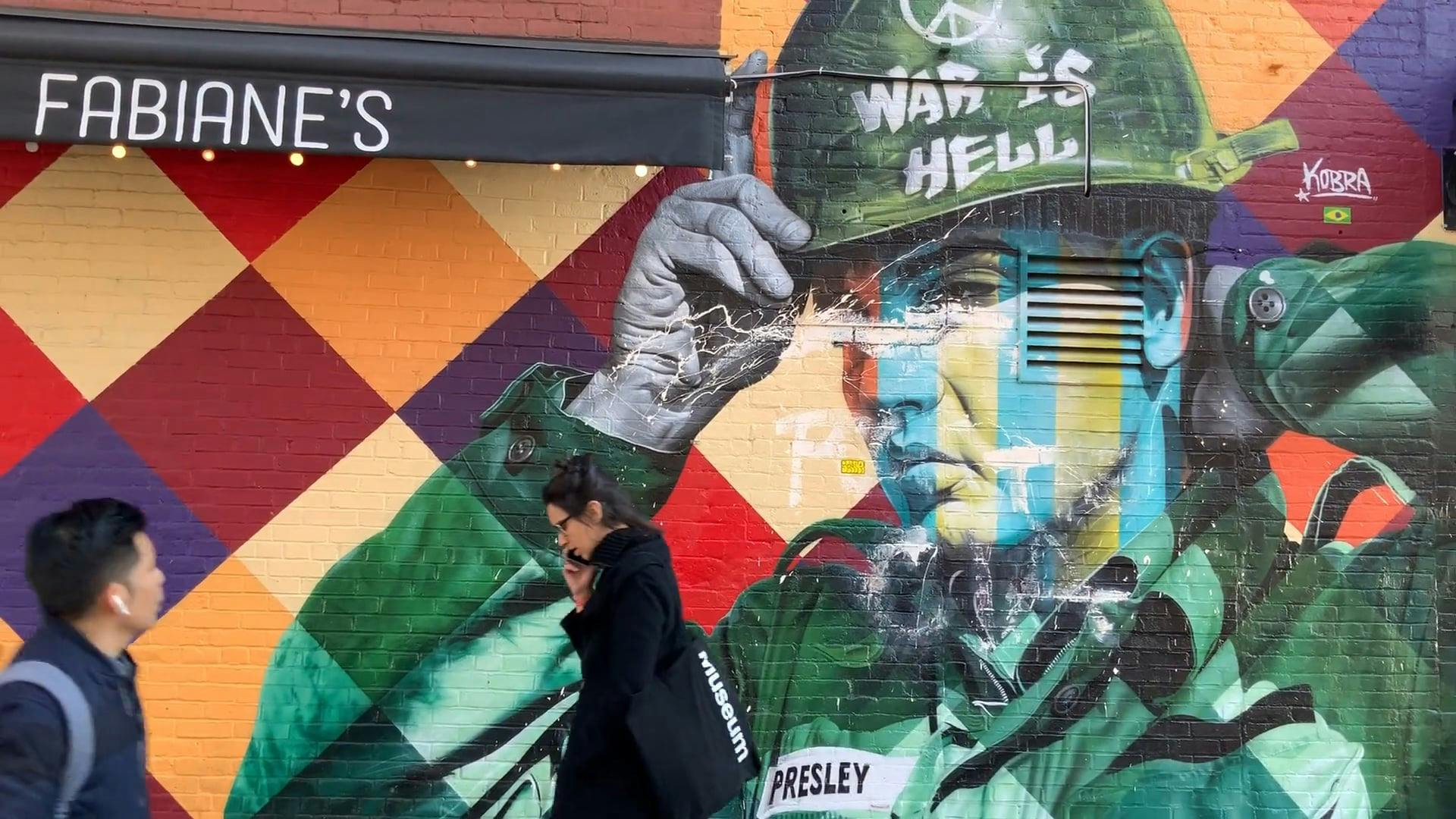 A Mural Painting Of Elvis Presley Calling For Peace · Free Stock Video