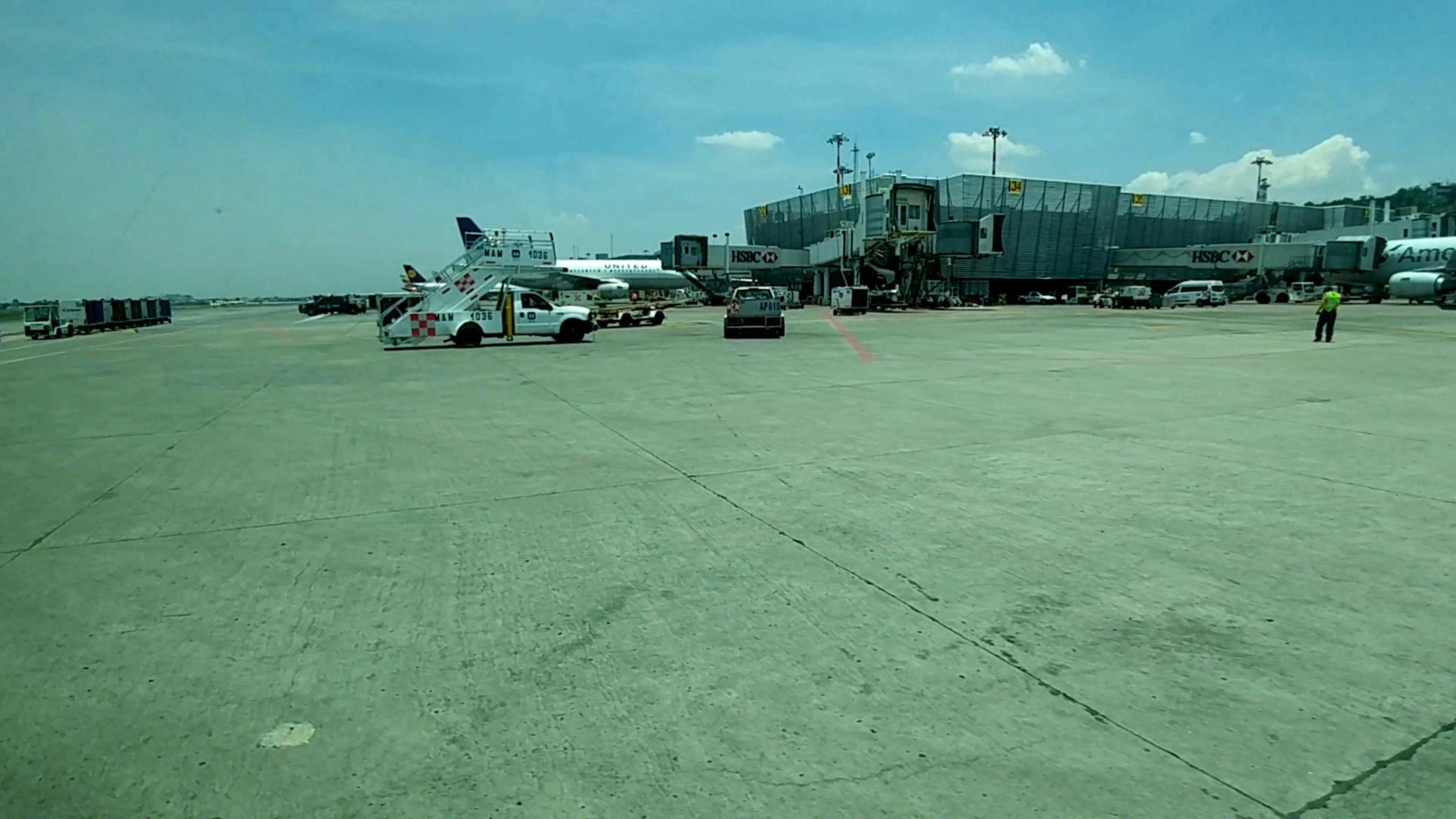 An Outdoor Shot of an Airport Docking Area Free Stock Video Footage ...