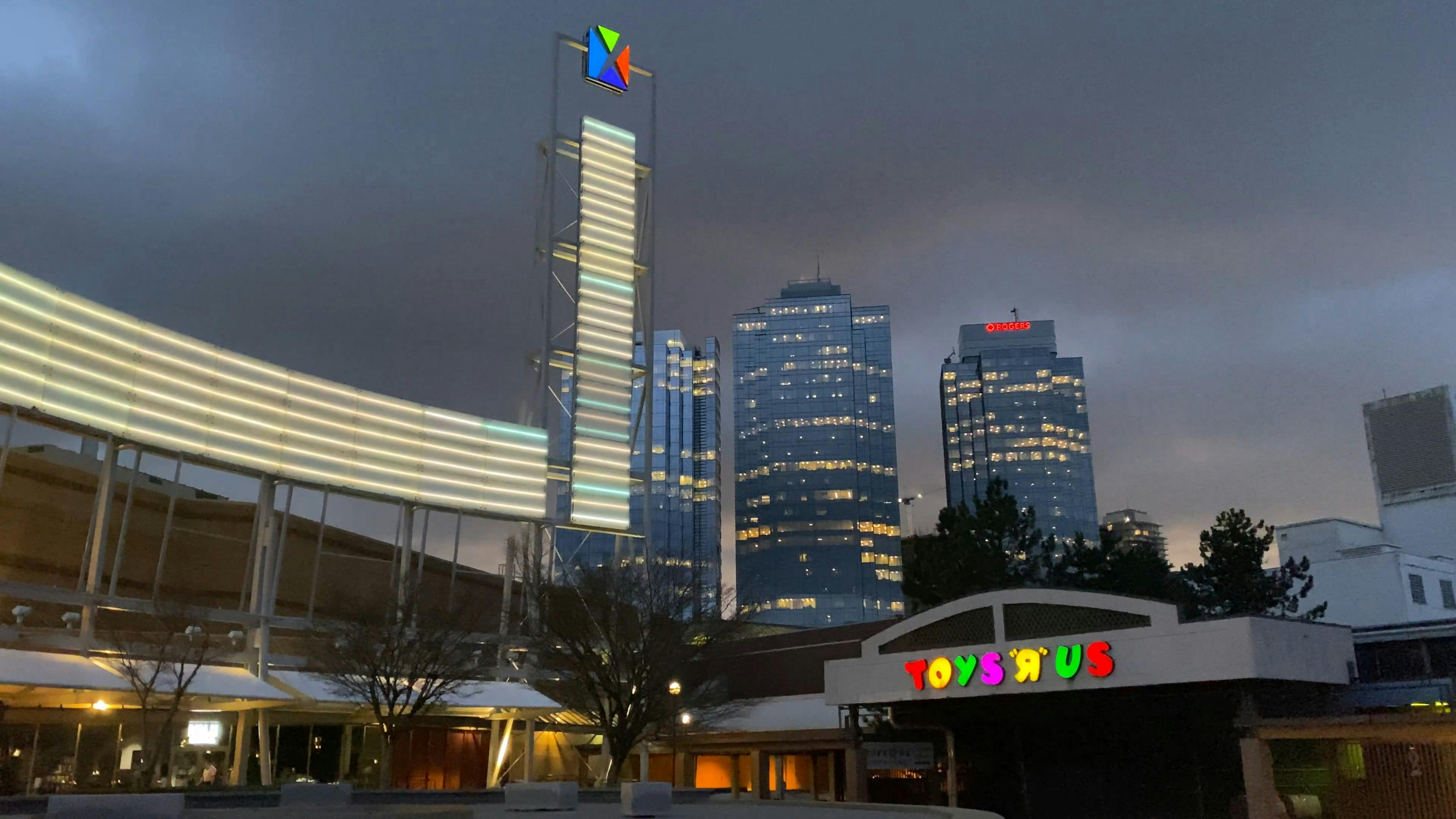 In Front of a Shopping Mall at Night · Free Stock Video